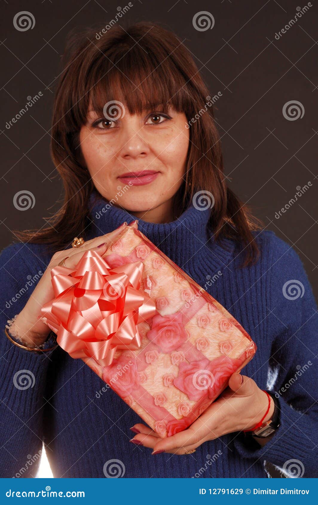 Woman holding present stock image. Image of smiling, smile - 12791629