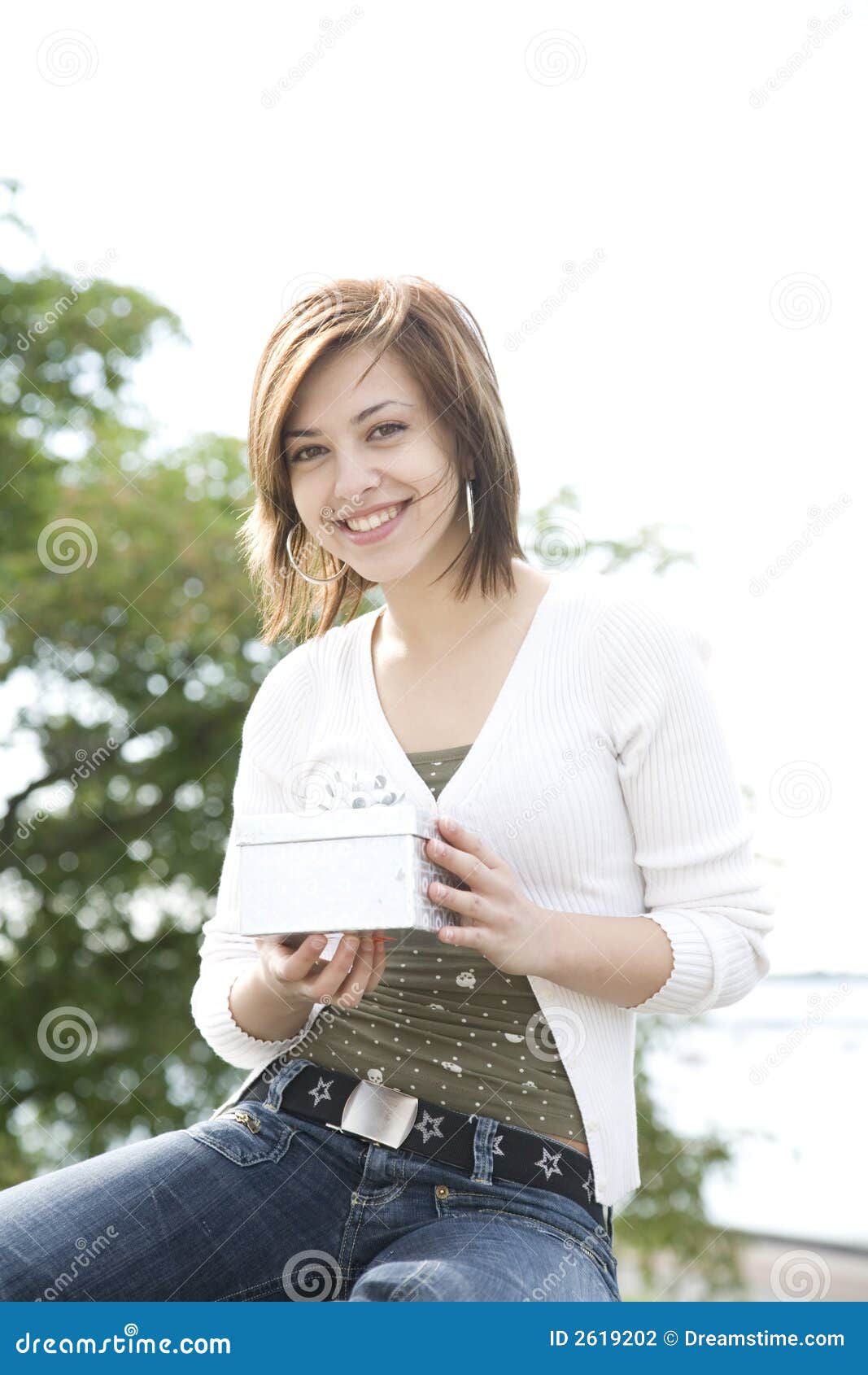 Woman holding a present stock photo. Image of holiday - 2619202