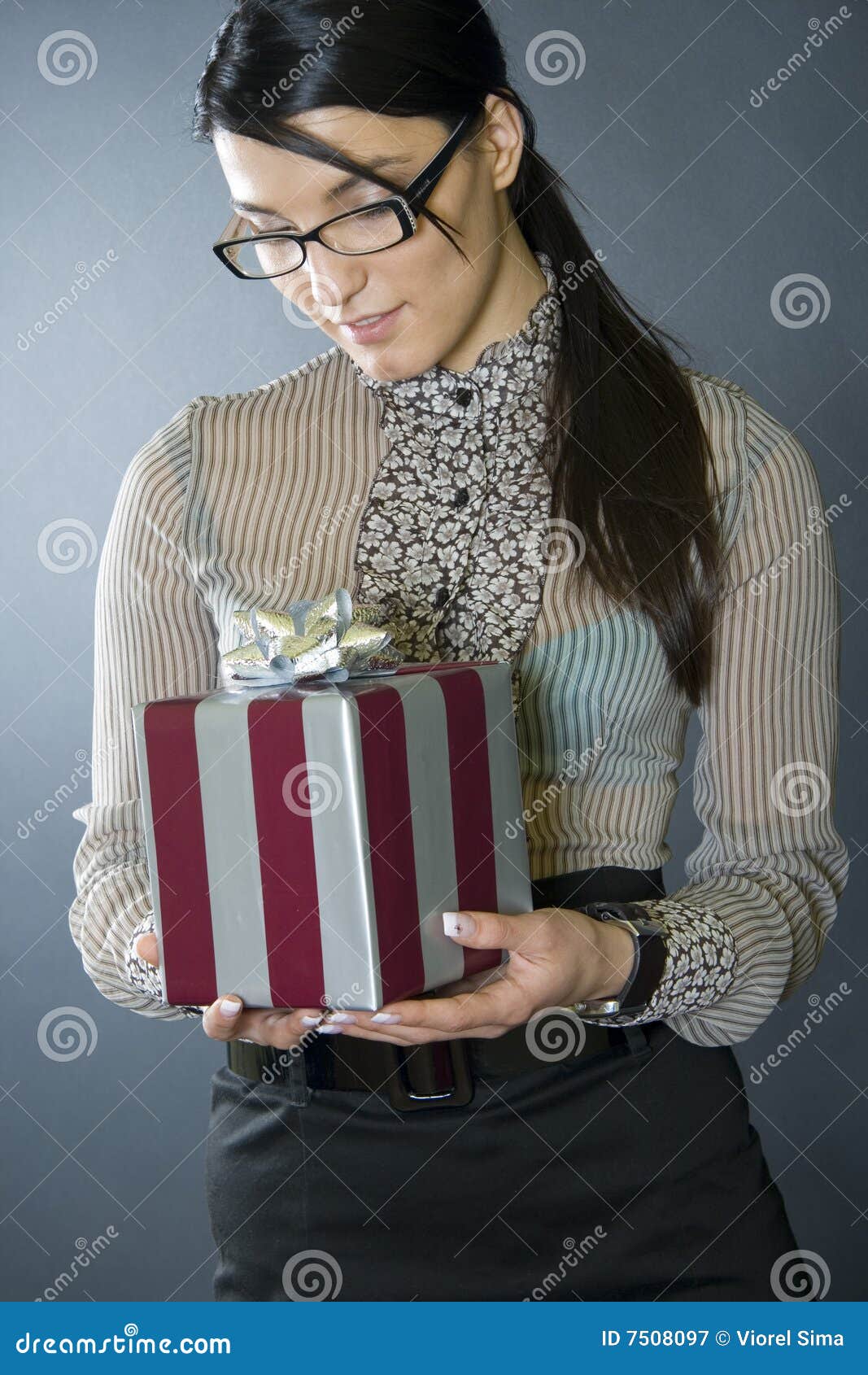 Woman holding a present stock image. Image of caucasian - 7508097
