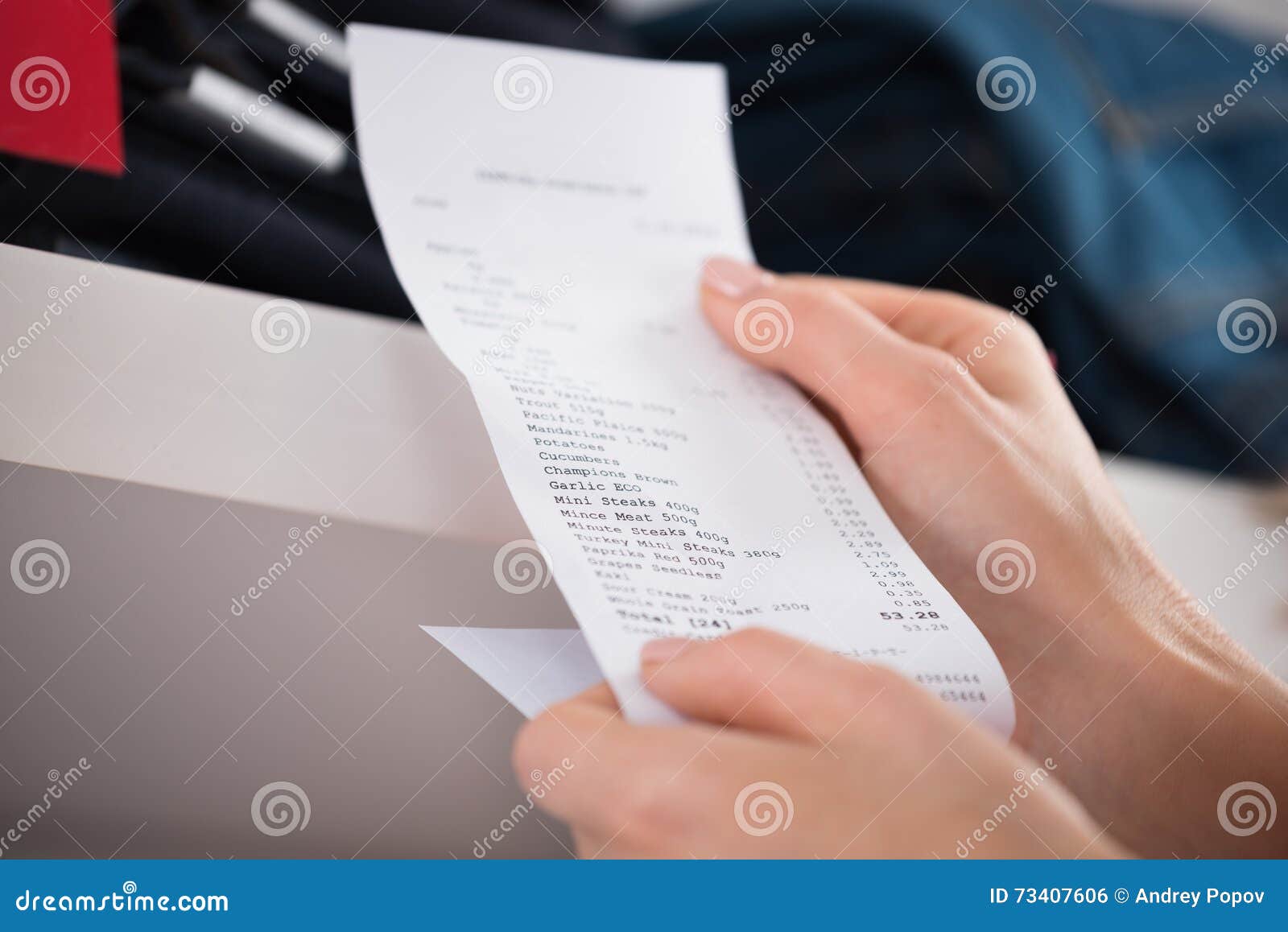 Woman Holding Receipt in Store Stock Photo - Image of hand, cost: 73407606