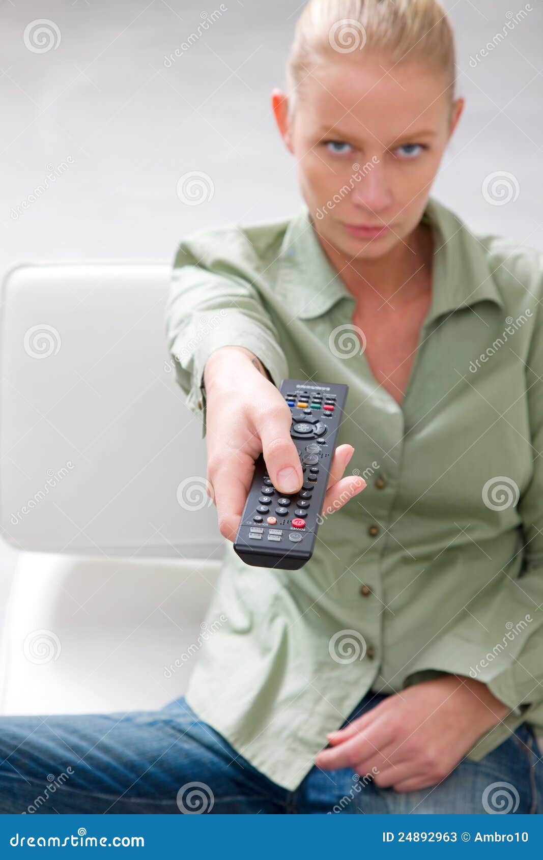 Woman Holding Remote Control Stock Image - Image of sofa, indoor: 24892963