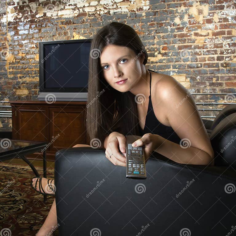 Woman Holding Remote Control Stock Image - Image of adult, square: 4997277