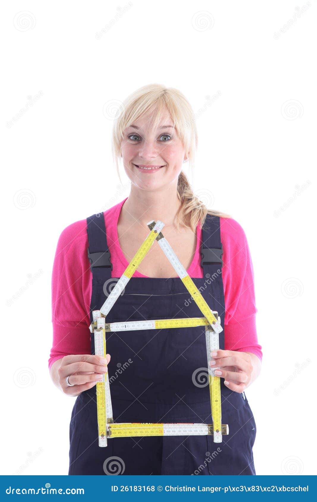 Woman Holding a Ruler in the Form of a House Stock Photo - Image of ...