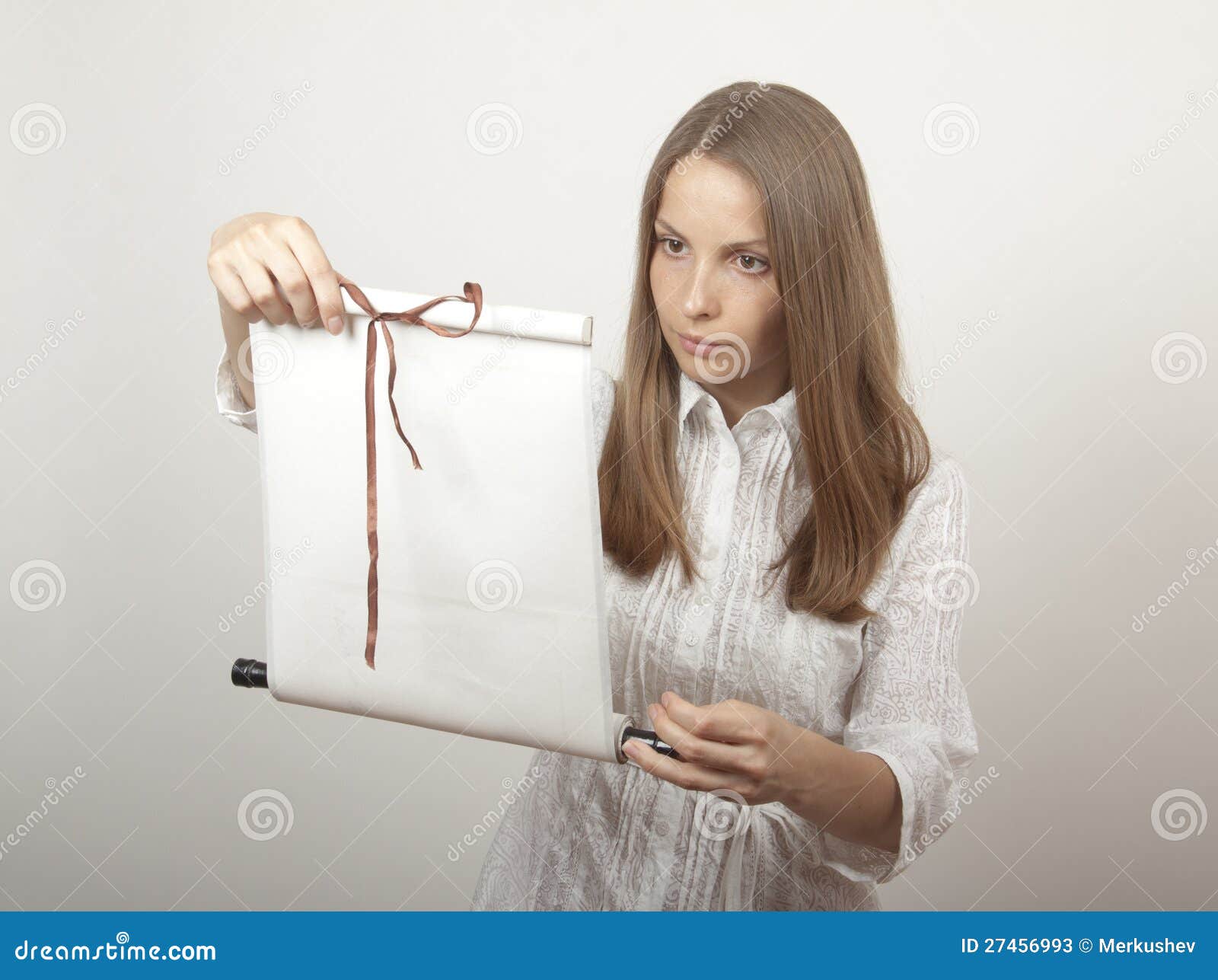 Woman holding scroll stock image. Image of parchment - 27456993