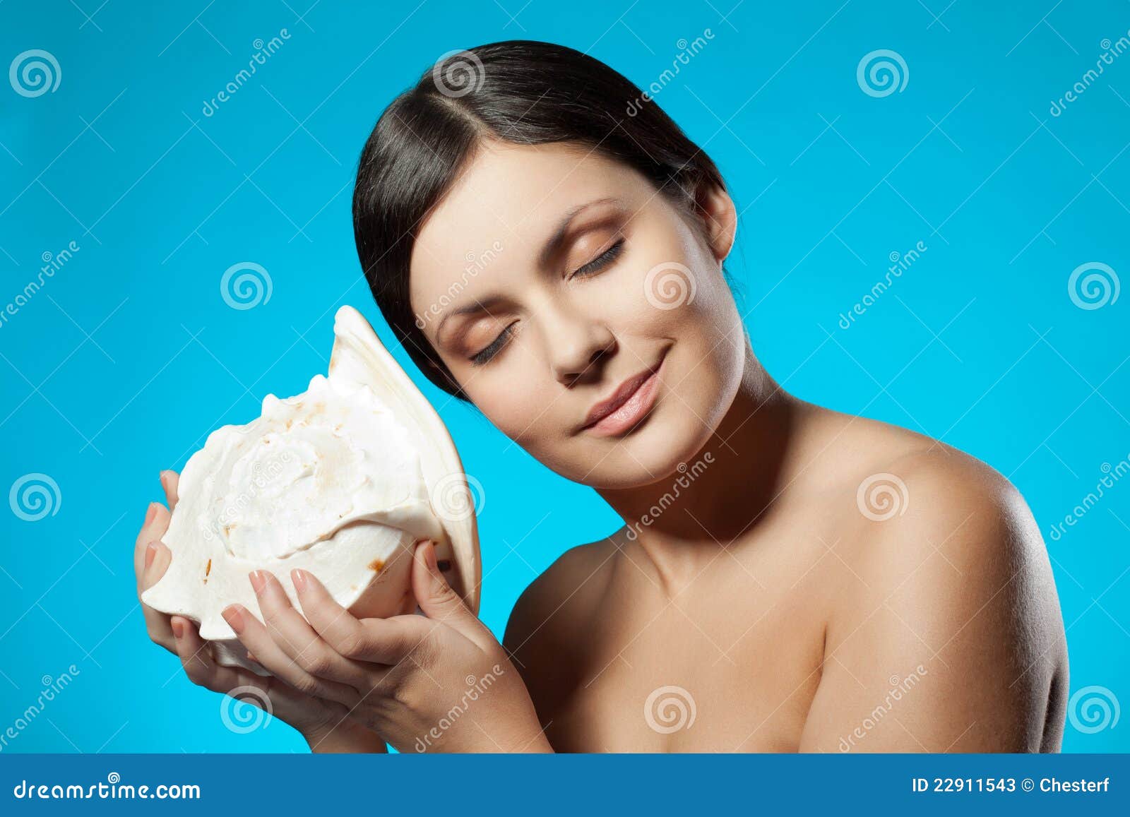 Woman holding seashell stock image. Image of lifestyle - 22911543