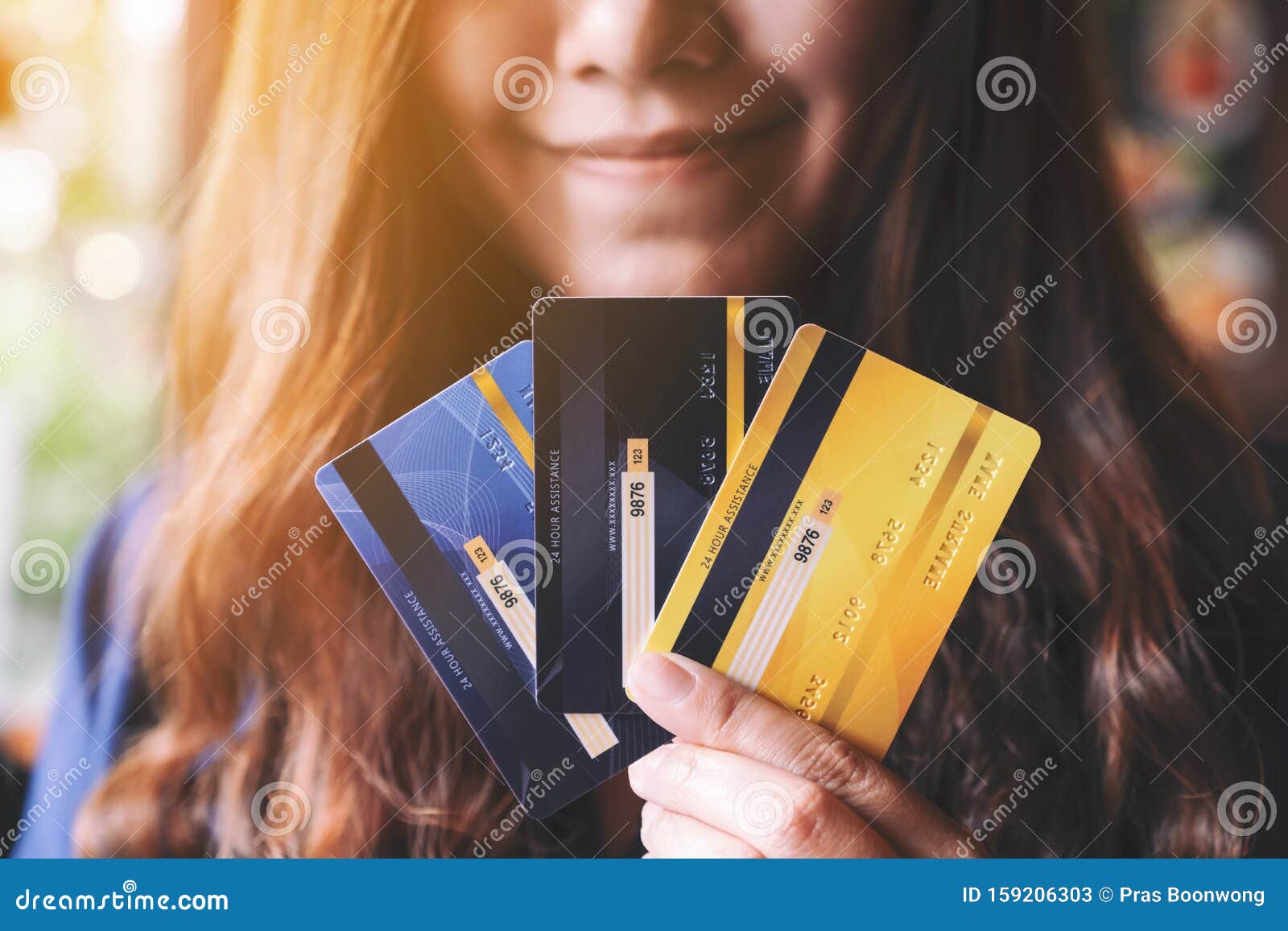 A Woman Holding and Showing Credit Cards Stock Image - Image of giving ... A Woman Holding and Showing Credit Cards Stock Image - Image of giving ...