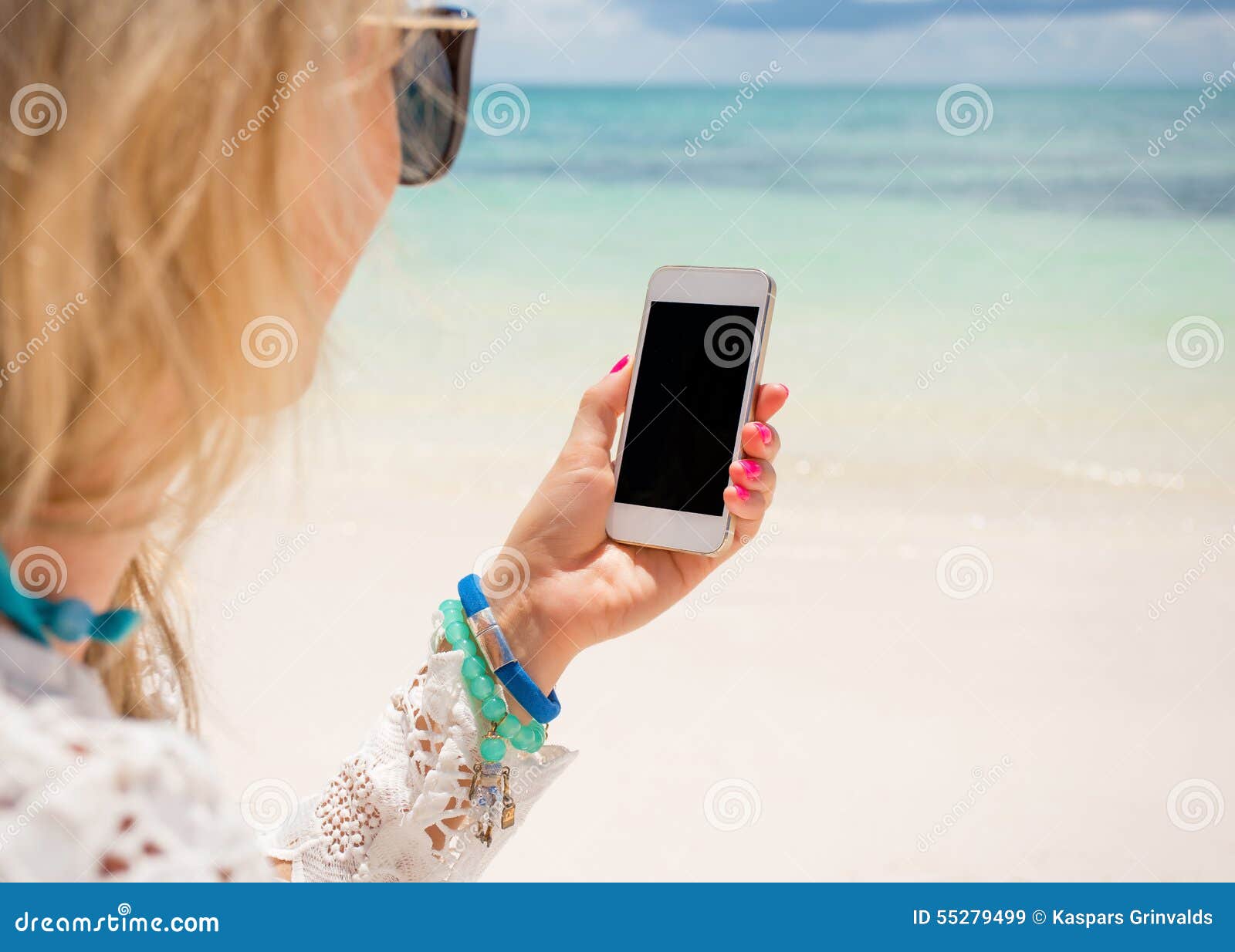 Woman Holding Smartphone in Hand on the Beach Stock Image - Image of ...