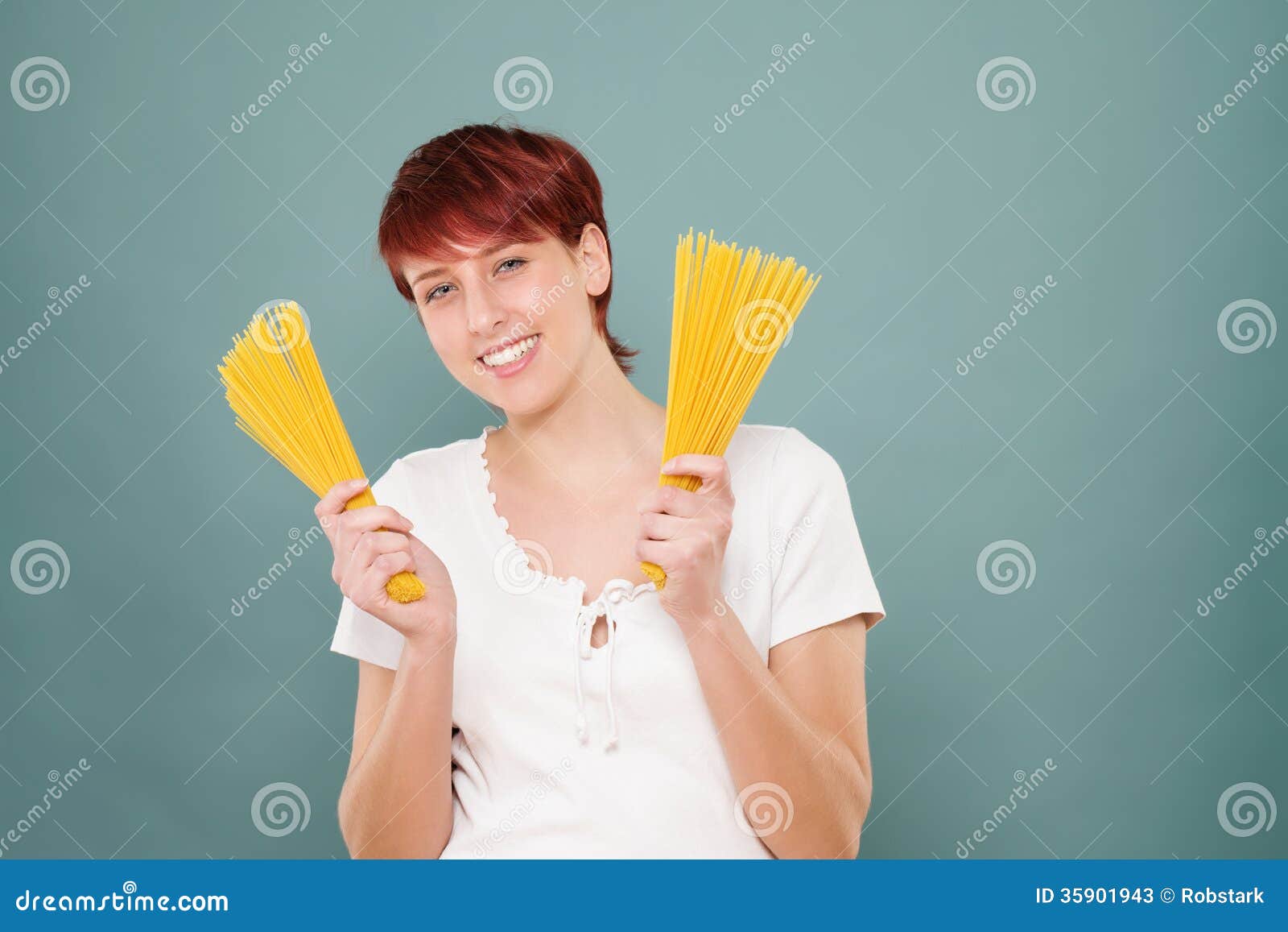 Woman holding spaghetti stock image. Image of redhead - 35901943