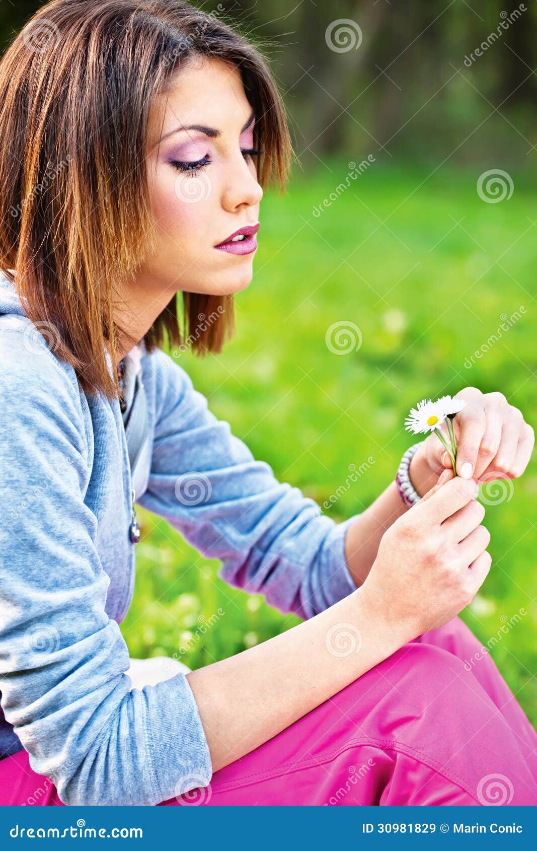 Woman Holding Spring Flowers Stock Image - Image of female, portrait ...