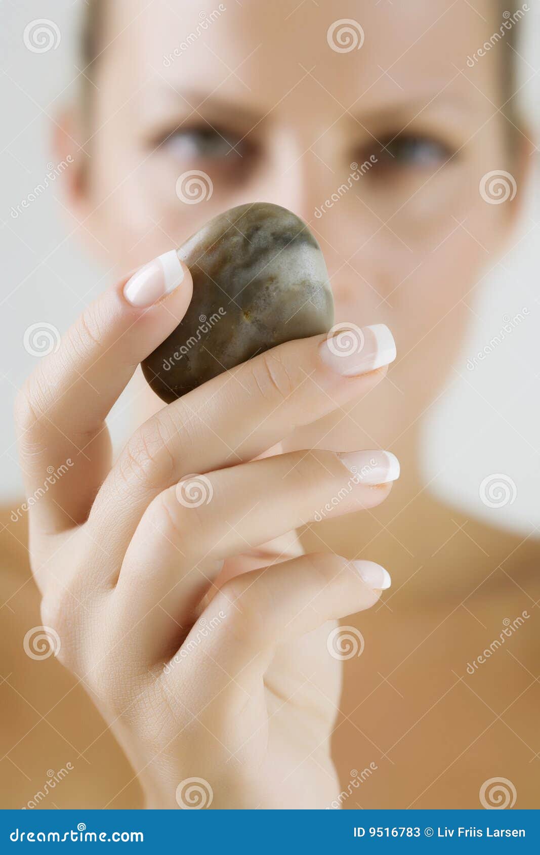 Woman holding stone stock image. Image of beauty, nature - 9516783