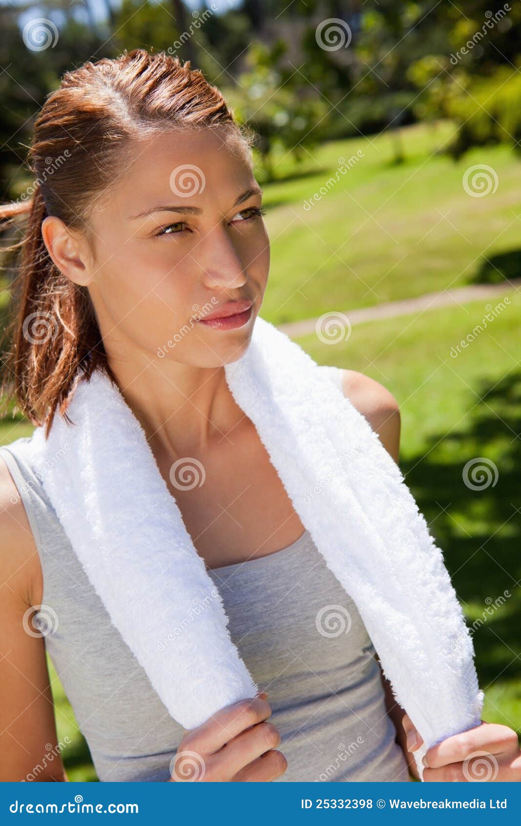 Woman Holding a Towel with Both Hands Stock Photo - Image of leisure ...
