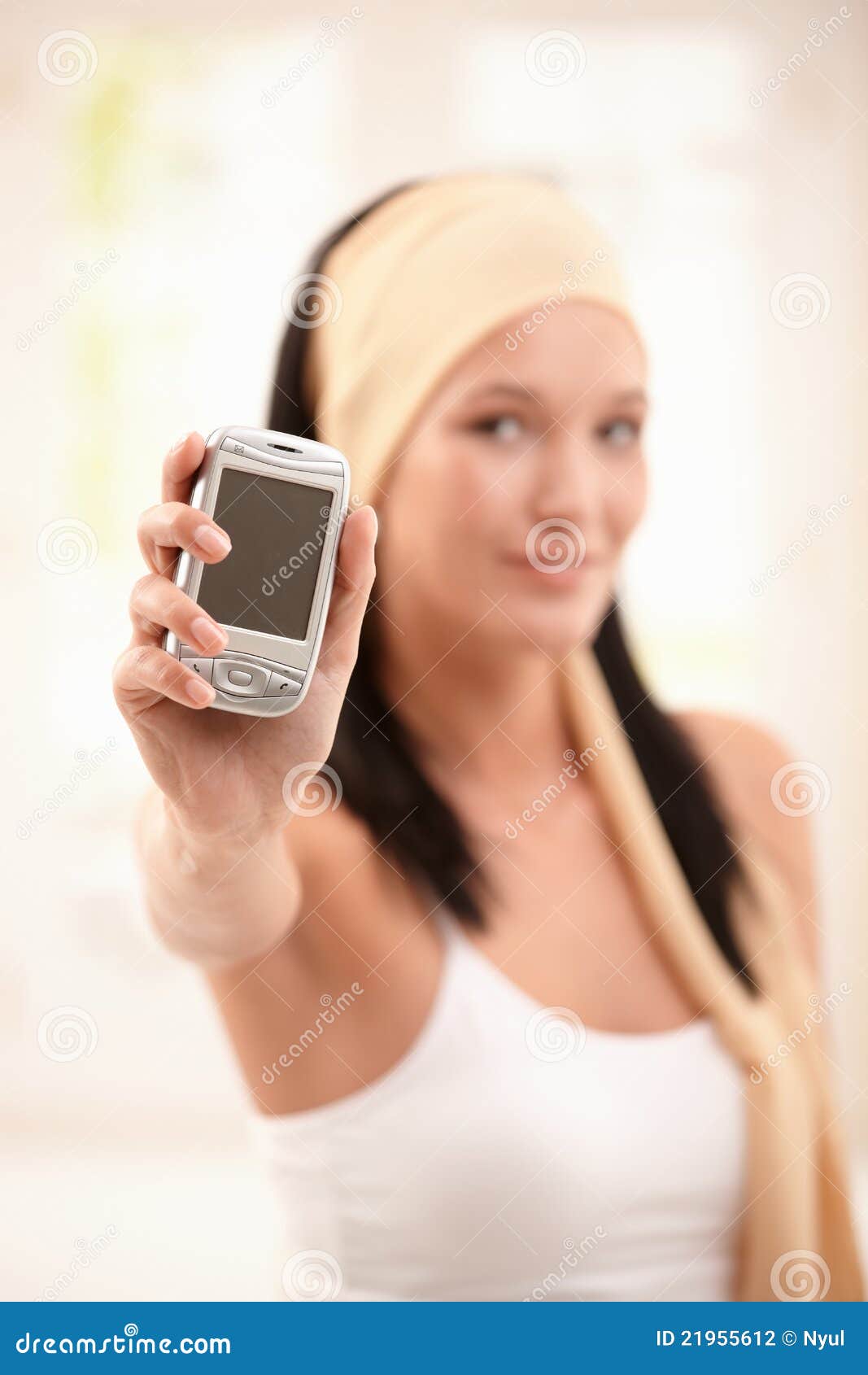 Woman Holding Up Mobile Phone in Focus Stock Photo - Image of hand ...