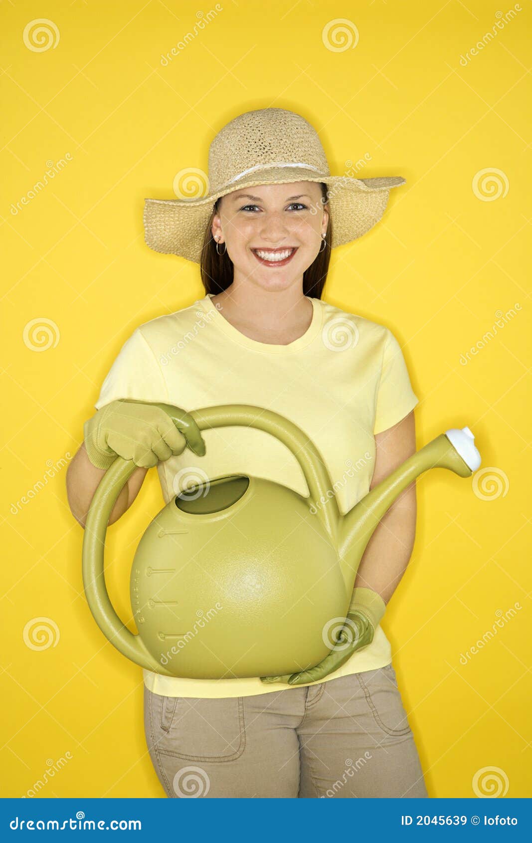 Woman Holding a Watering Can. Stock Image - Image of person, young: 2045639