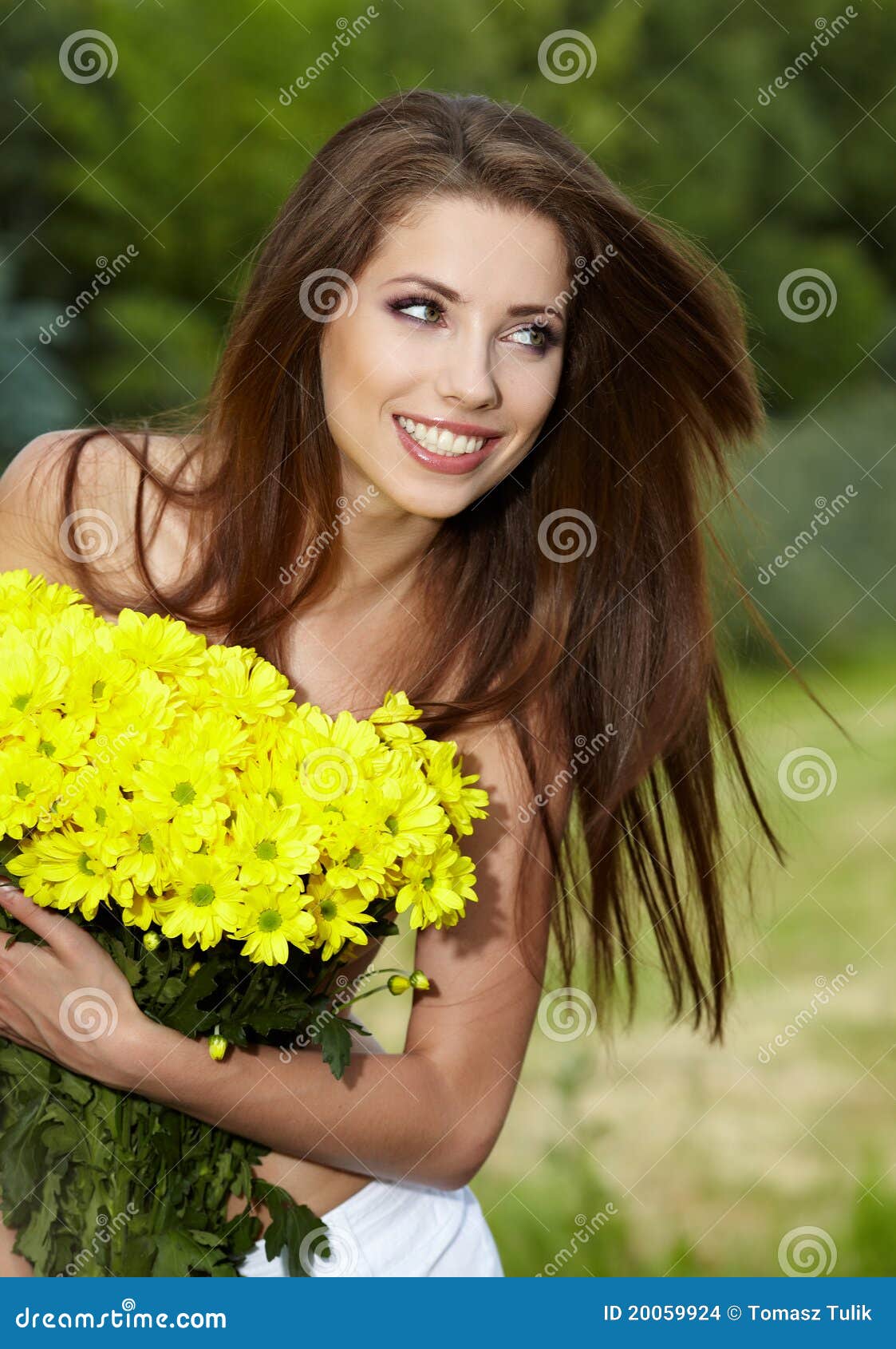 Woman Holding Yellow Flowers Stock Photo - Image of healthy, active ...