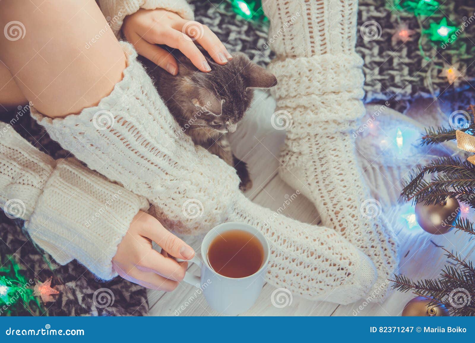 Woman Holds a Cup of Tea beside Her Legs Stock Image - Image of girl ...