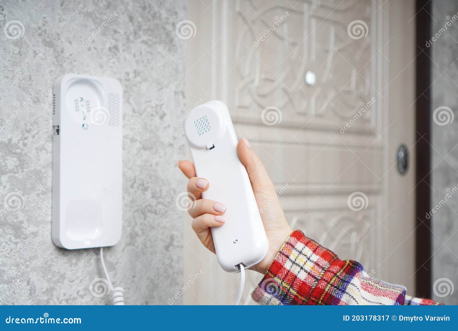 Woman Holds the Intercom Receiver in the Hand Stock Image - Image of ...