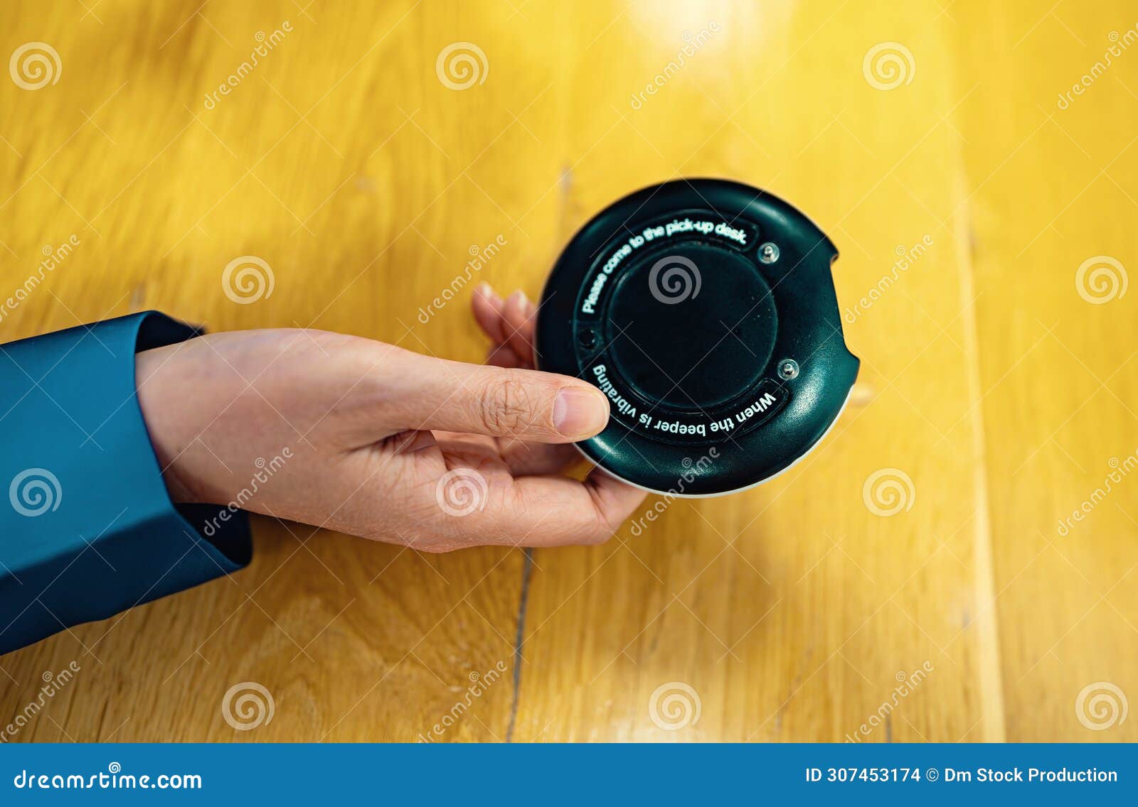 Woman Holds a Restaurant Pager. Stock Photo - Image of hand, pick ... Woman Holds a Restaurant Pager. Stock Photo - Image of hand, pick ...
