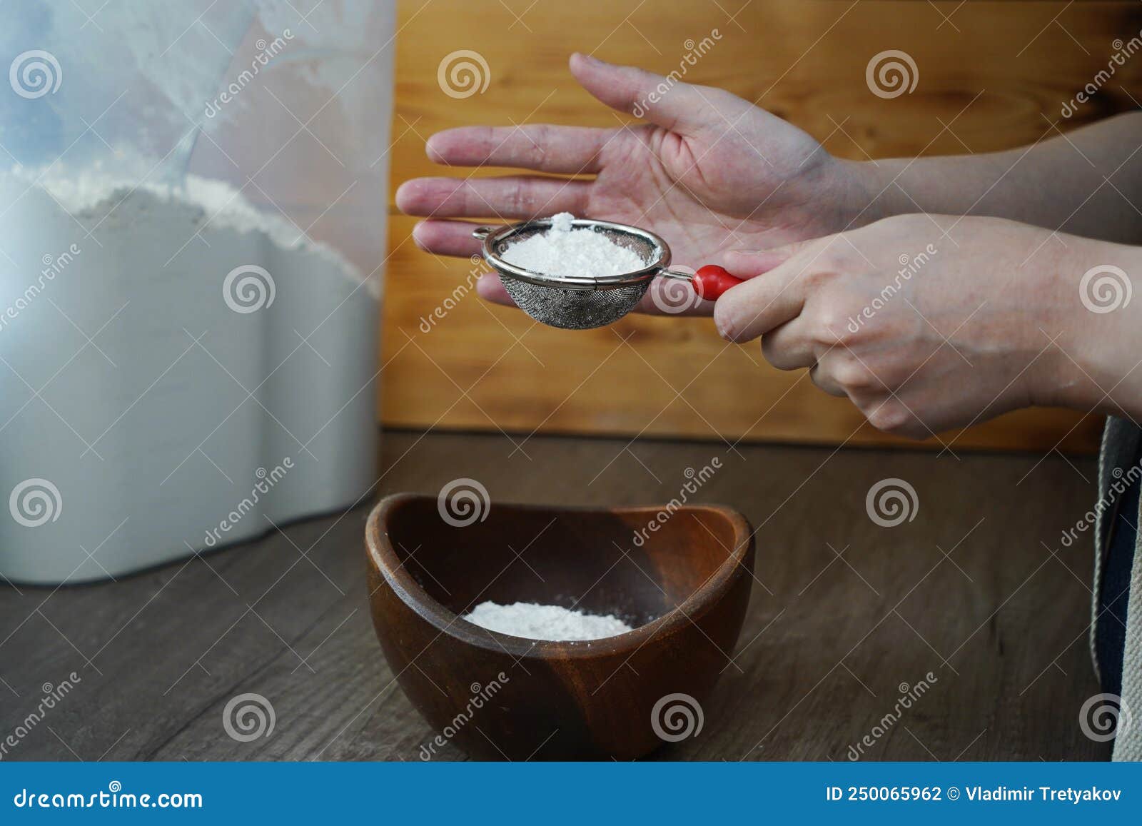 A Woman Holds a Strainer with Flour in Her Hands Stock Photo - Image of ...