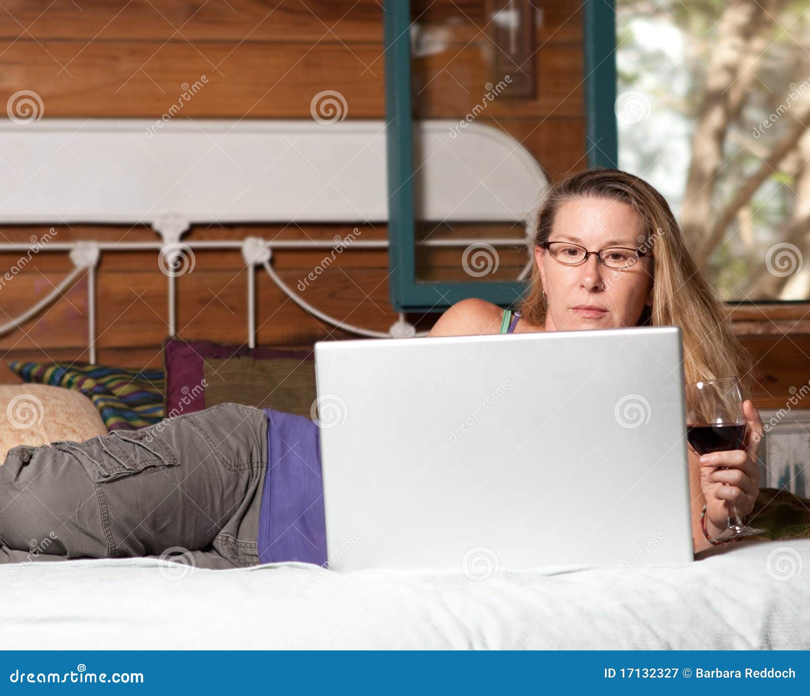 Woman at Home with Laptop Computer and Wine Glass Stock Image - Image ...