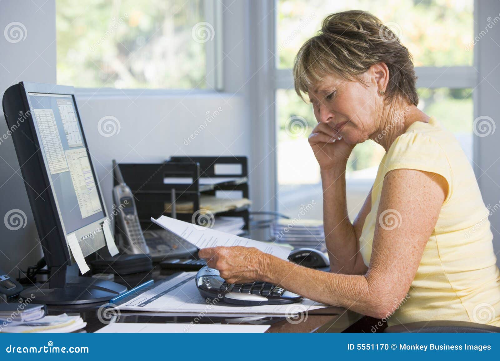 Woman in Home Office with Computer and Paperwork Stock Photo - Image of ...