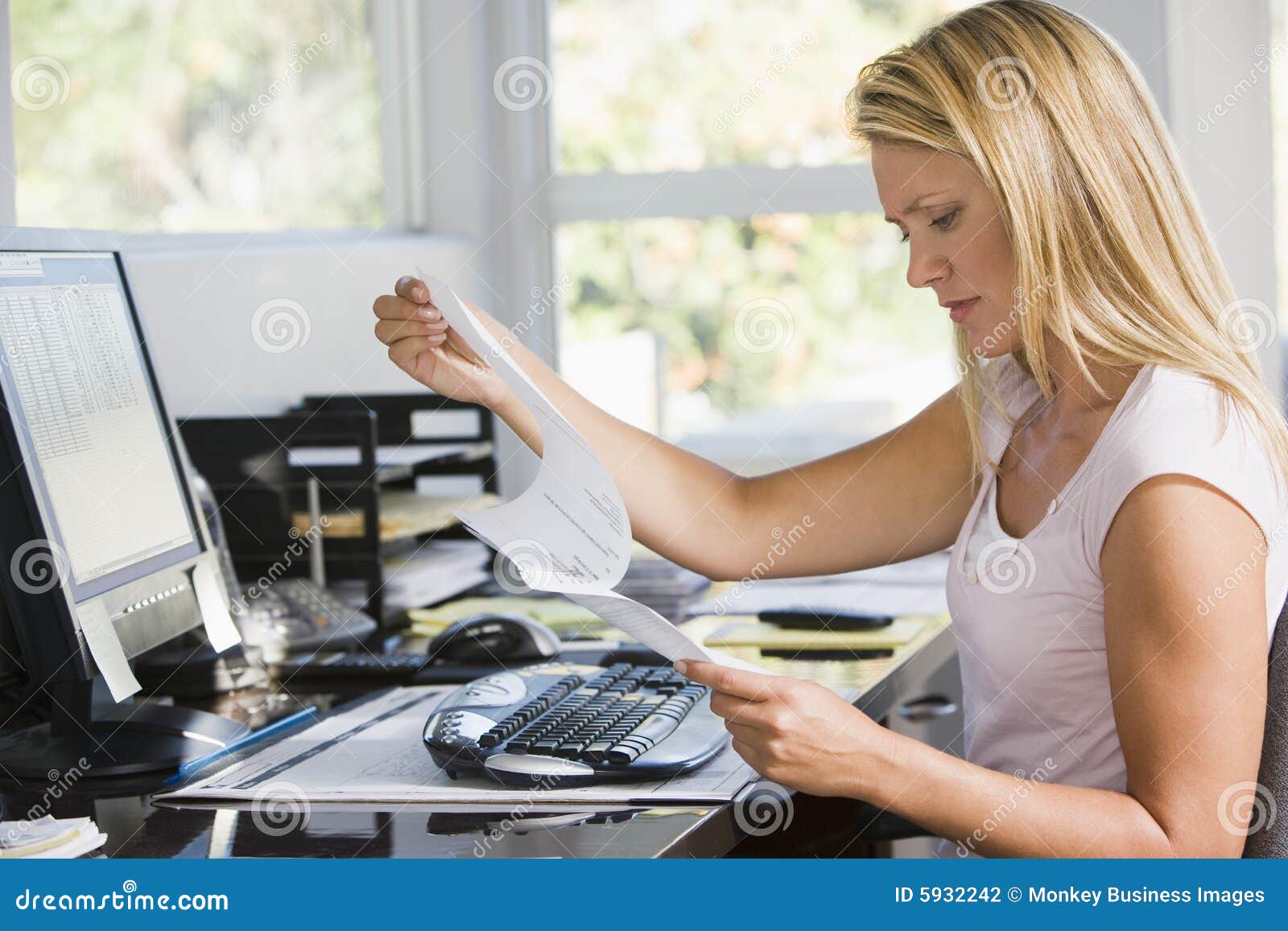 Woman in Home Office with Computer and Paperwork Stock Photo - Image of ...