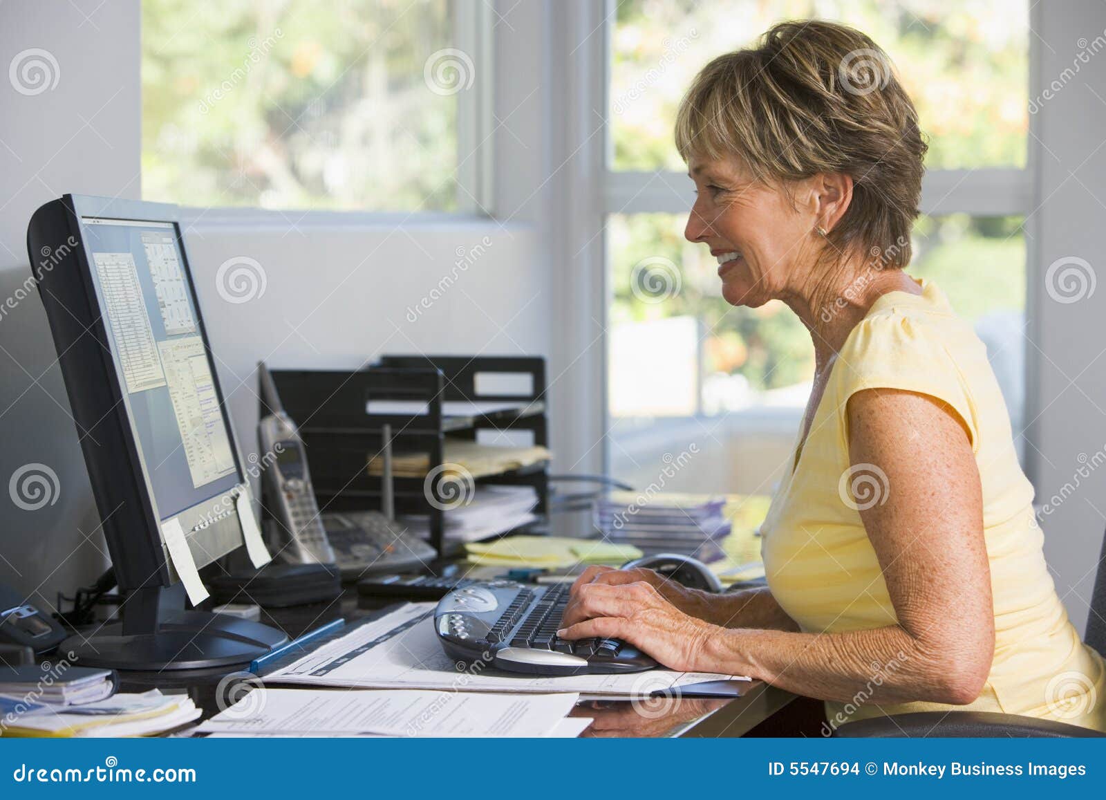 Woman in Home Office Using Computer Smiling Stock Photo - Image of home ...
