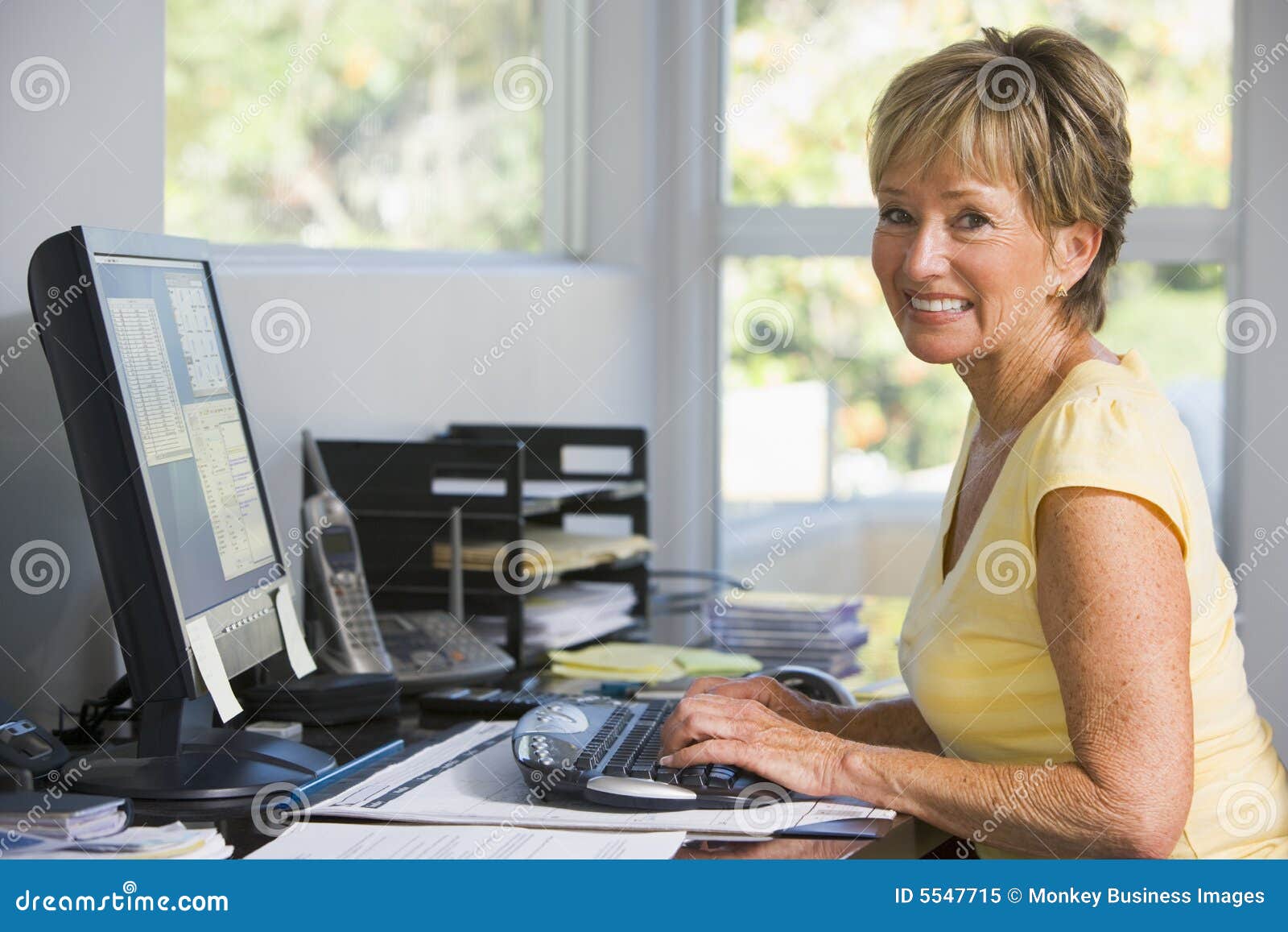 Woman in Home Office Using Computer Smiling Stock Image - Image of ...