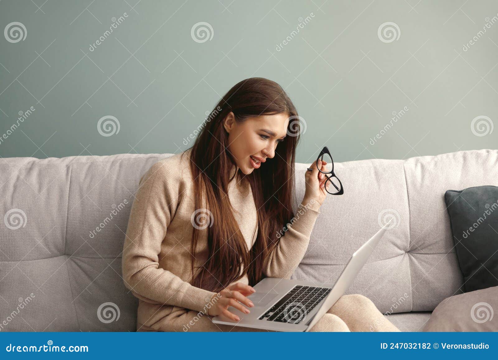 Woman at Home Using Laptop Sitting on Sofa, Online Working at Home ...