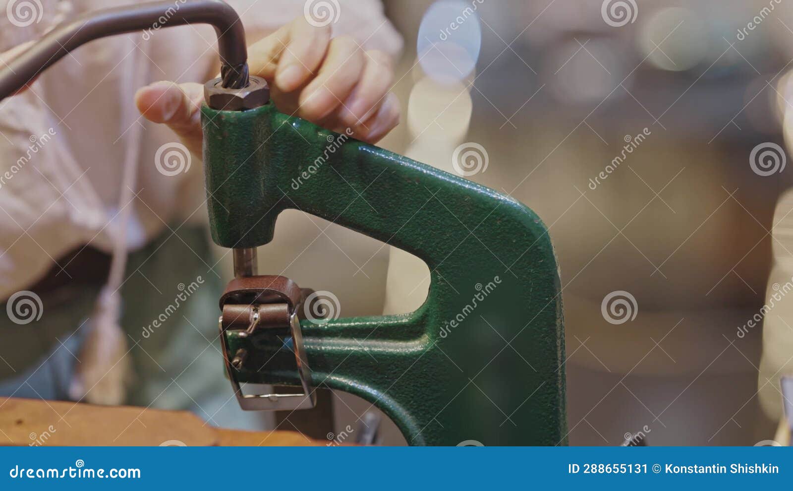 A Woman Hooks a Buckle To a Belt Using a Machine Stock Video - Video of ...