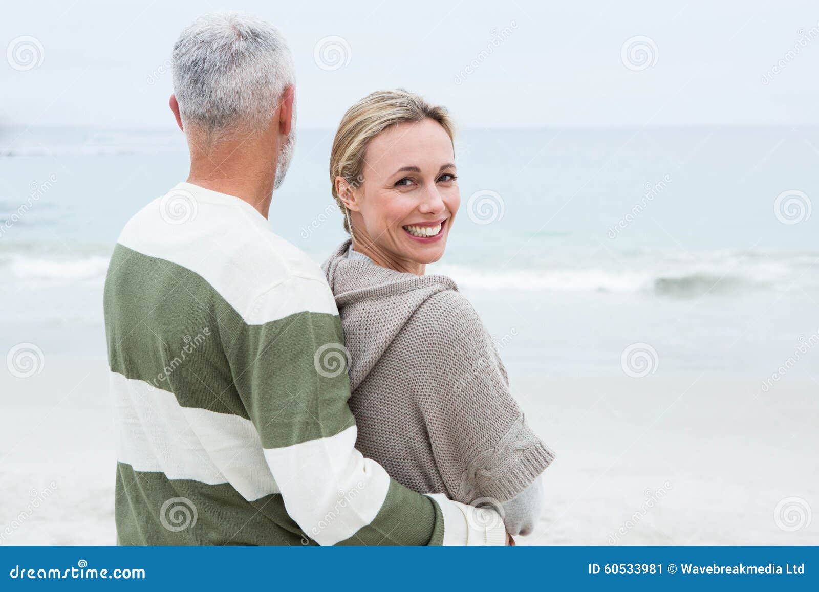 Woman hugging her partner stock image. Image of people - 60533981
