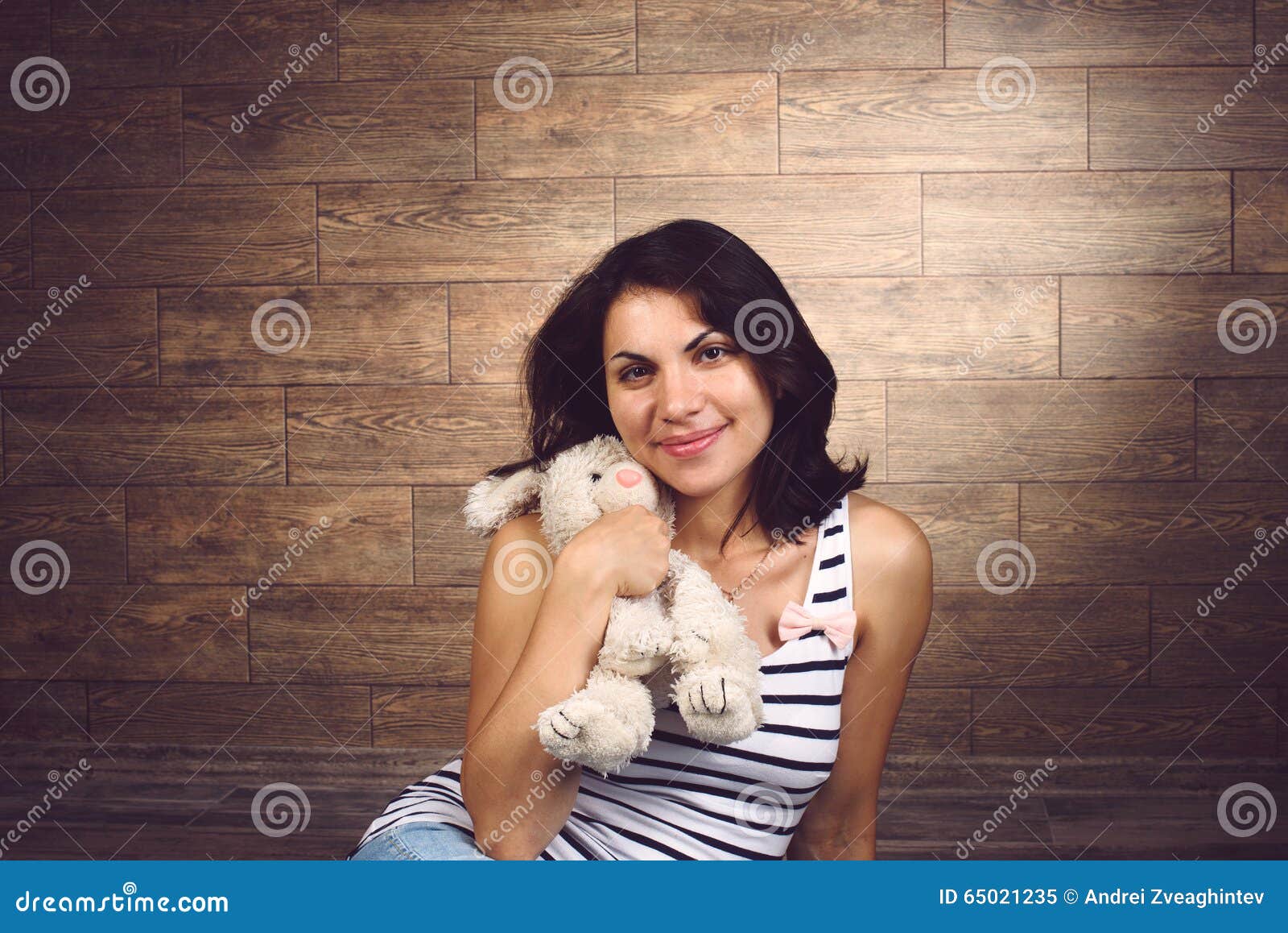 Woman Hugging Rabbit stock image. Image of care, holding - 65021235