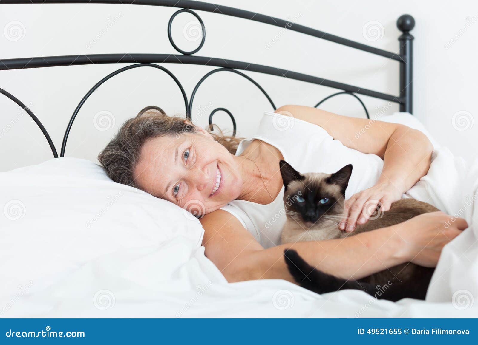Woman Hugging a Siamese Cat. Stock Image - Image of retirement, female ...