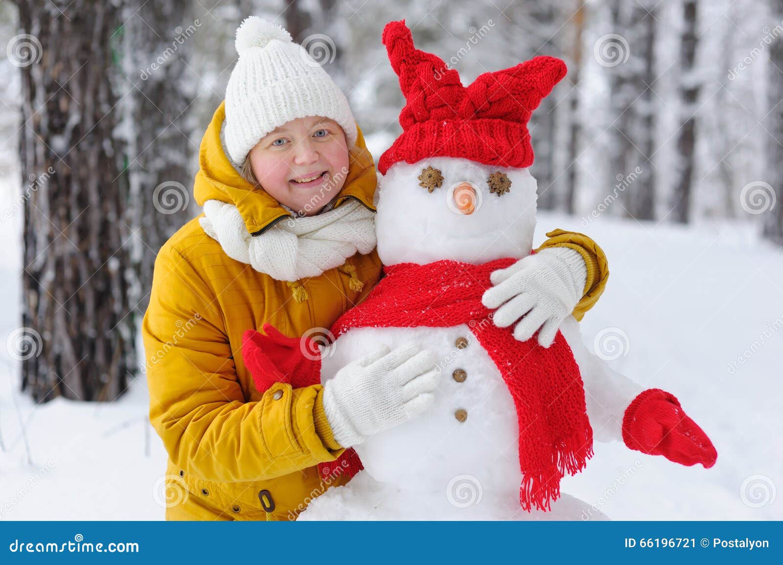 Woman Hugging a Snowman in Winter Park. Stock Image - Image of small ...
