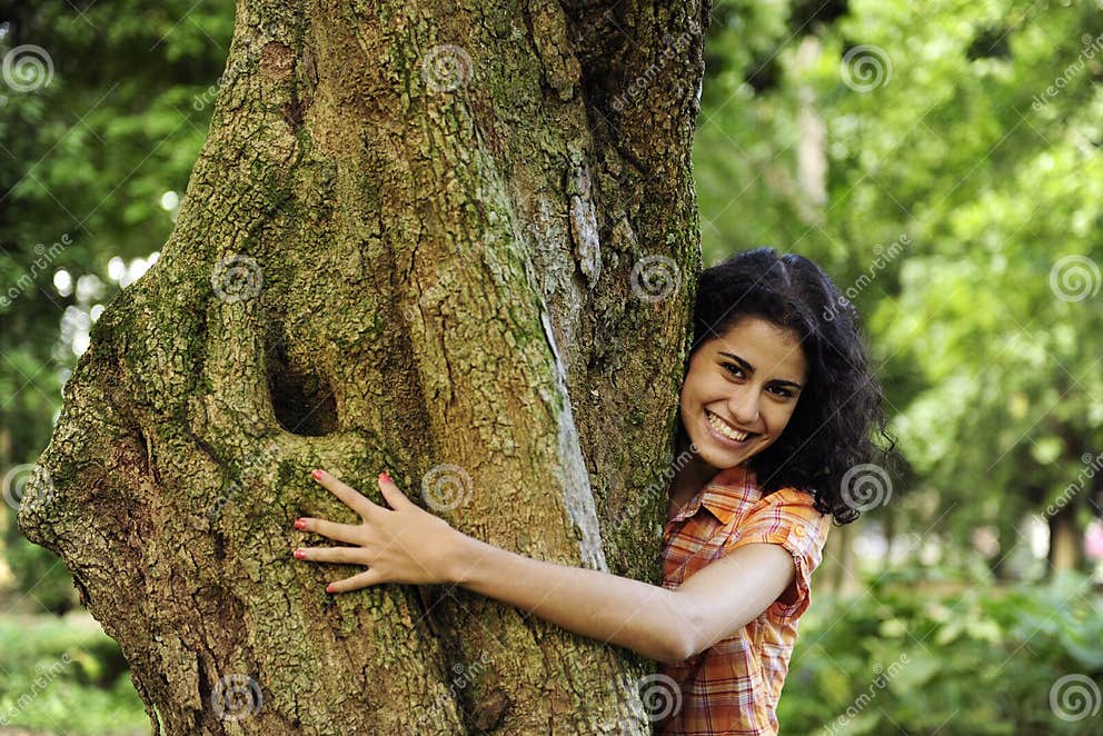 Woman Hugging a Tree in the Forest Stock Image - Image of american ...