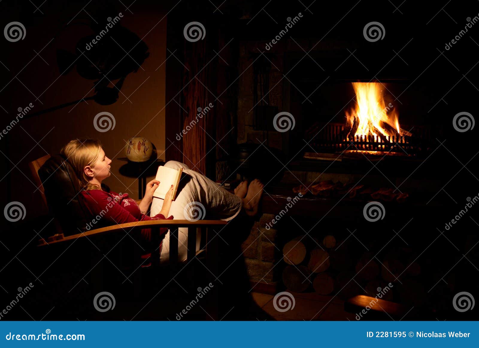 Woman infront of the fire stock image. Image of woman - 2281595