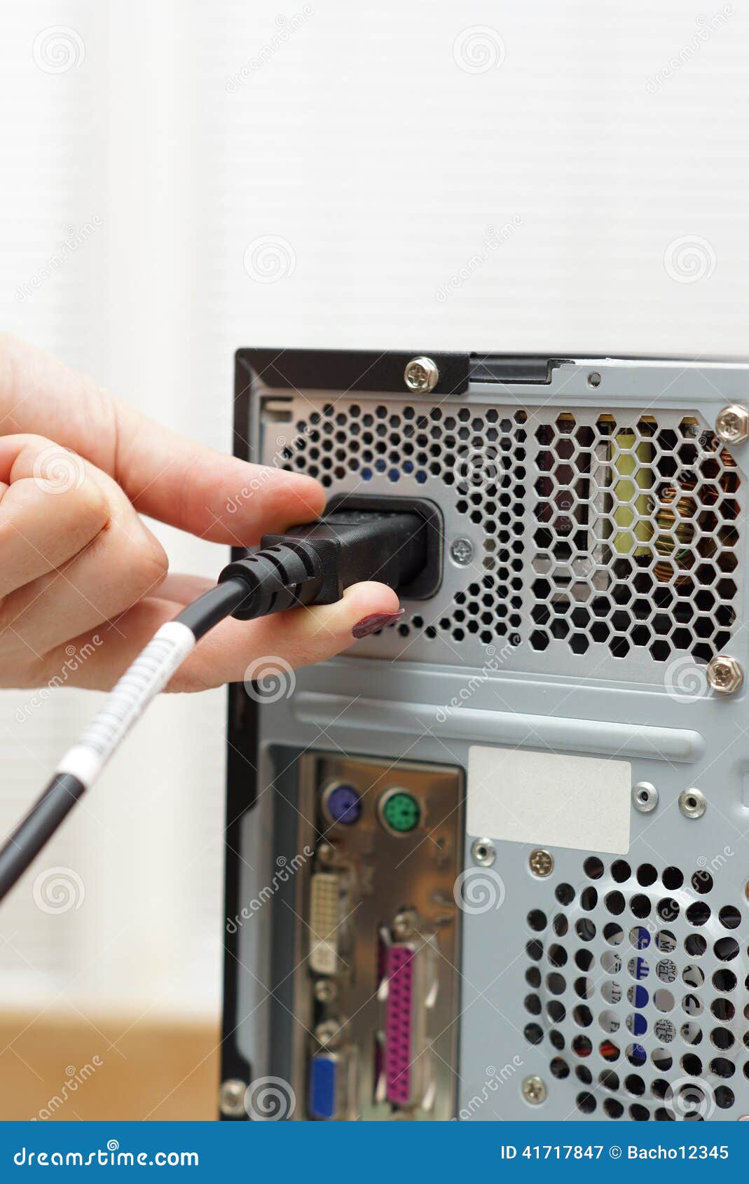 Woman Inserts Power Cord into a Computer Stock Image - Image of ...