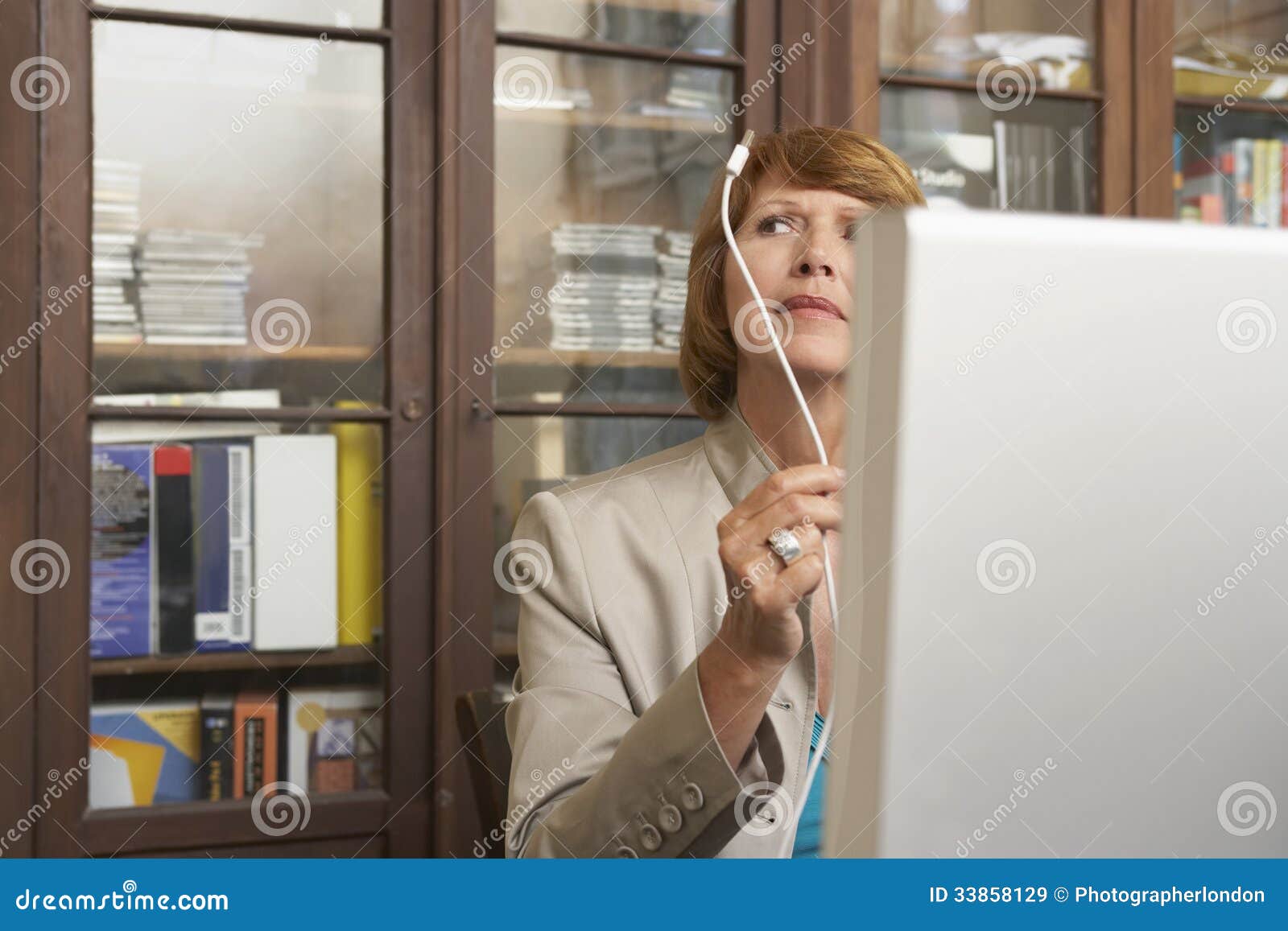 Woman Inspecting Computer Cable Stock Image - Image of computer, access ...