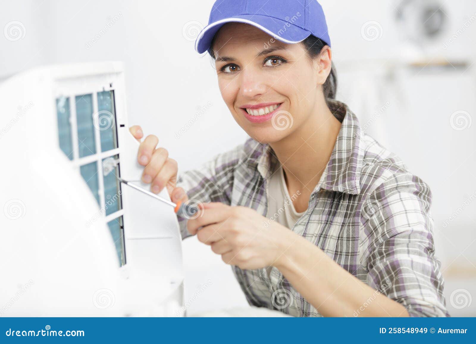 Woman Installing New Ac System Stock Image - Image of white, humidifier ...
