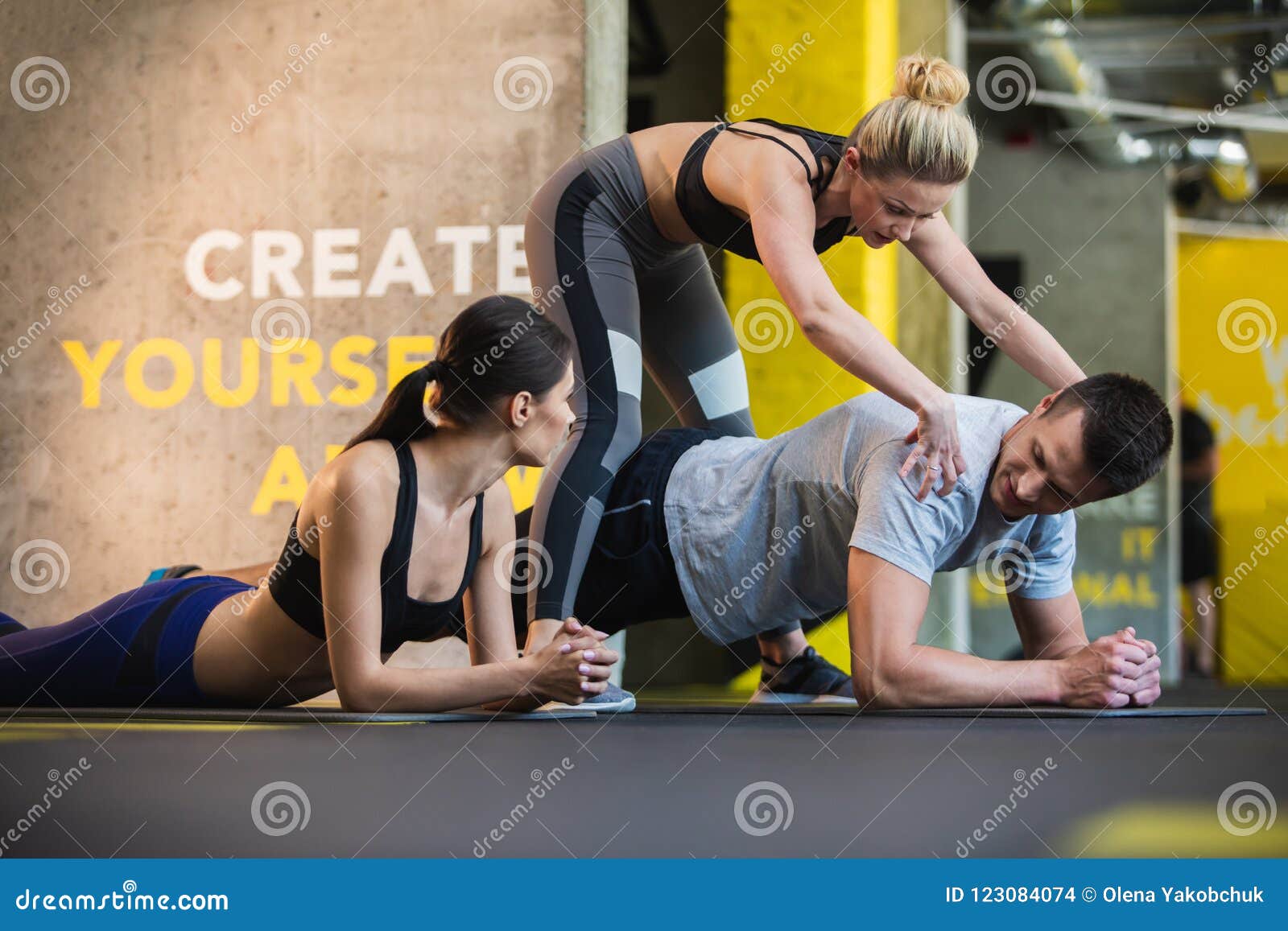 Female Coach is Training Couple in Sport Center Stock Photo - Image of ...