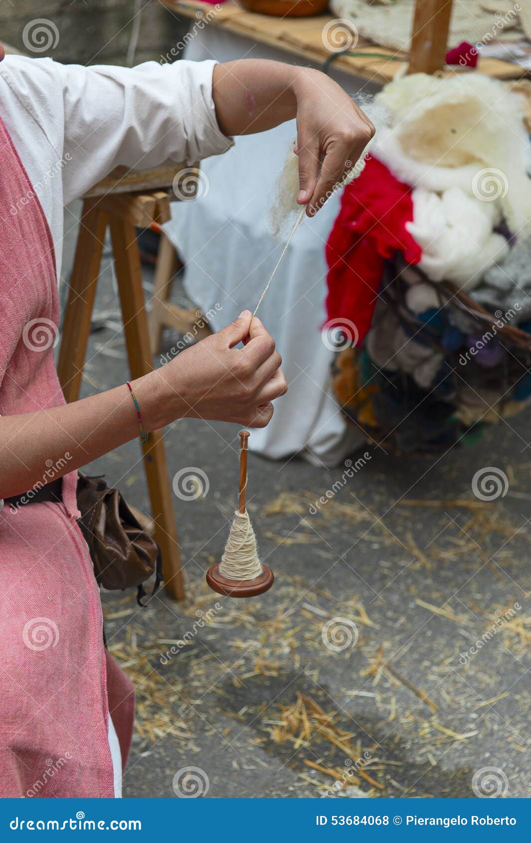 Woman Intent on Making a Piece of String Stock Photo - Image of making ...
