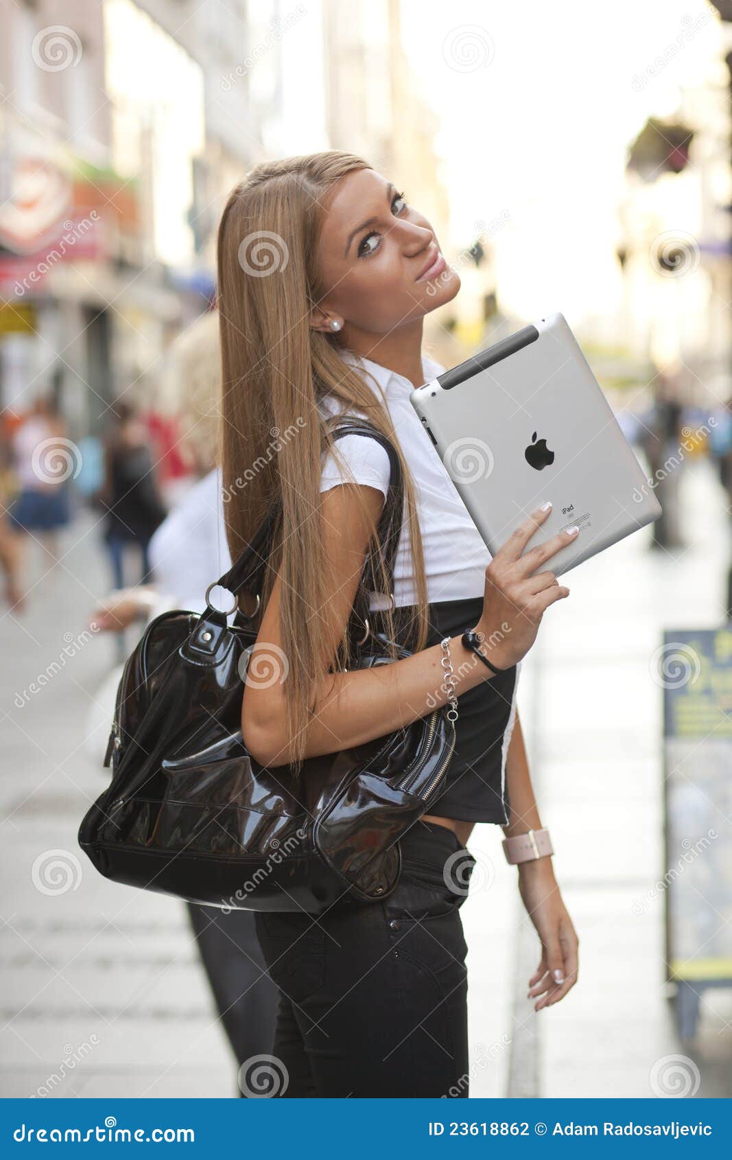Woman with IPad Tablet Computer Walking on Street Editorial Photography ...