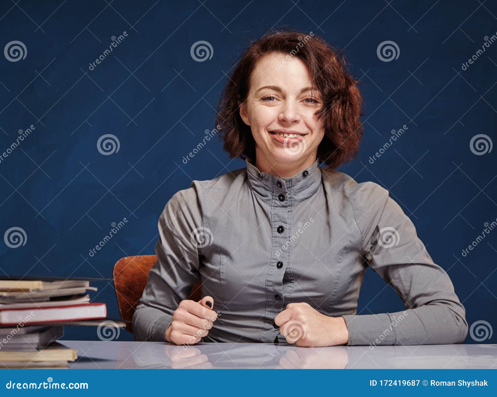 Woman with an Ironic Smile on Her Face at Work without Wanting To Work ...