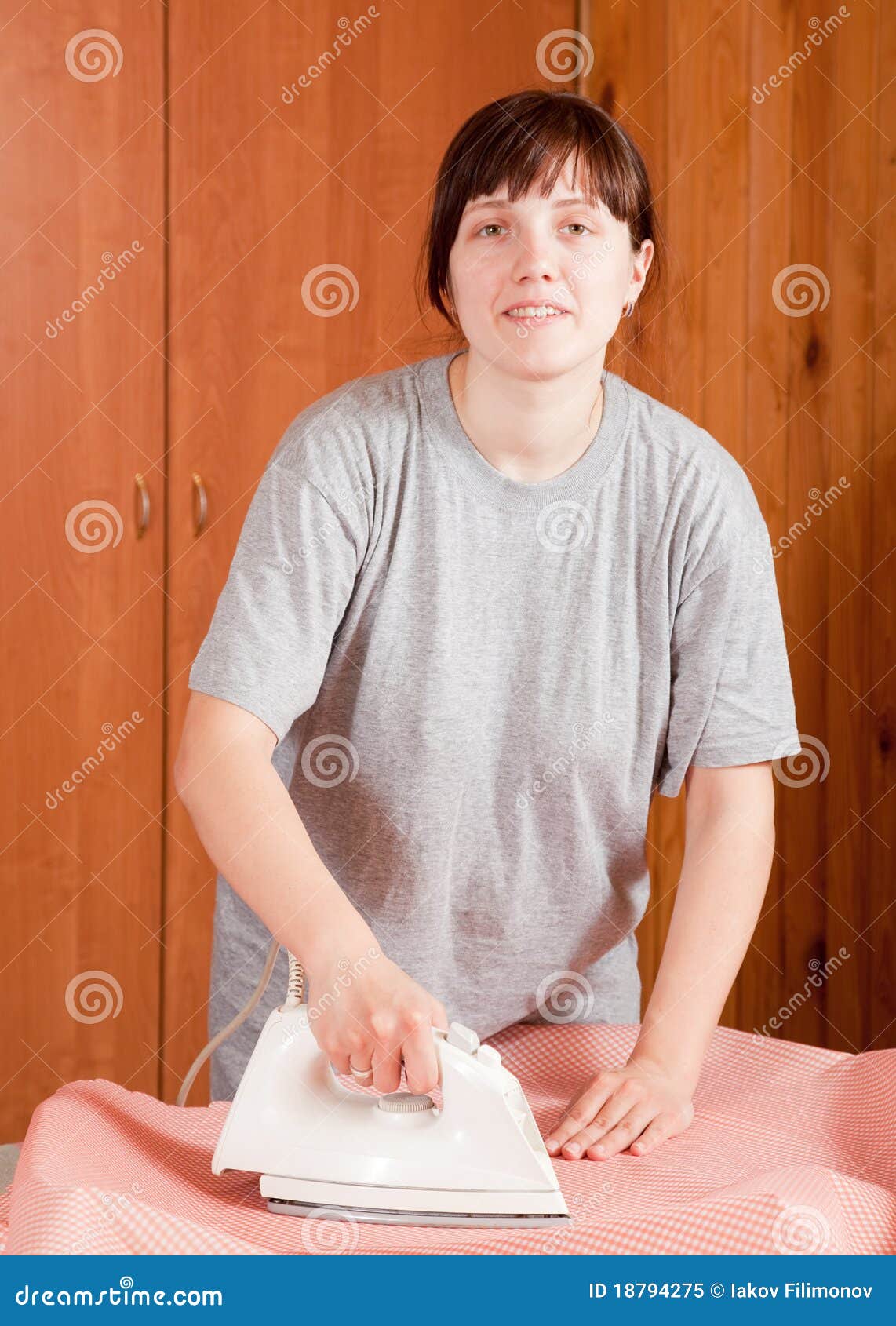 Woman ironing fabric stock image. Image of clothing, person - 18794275