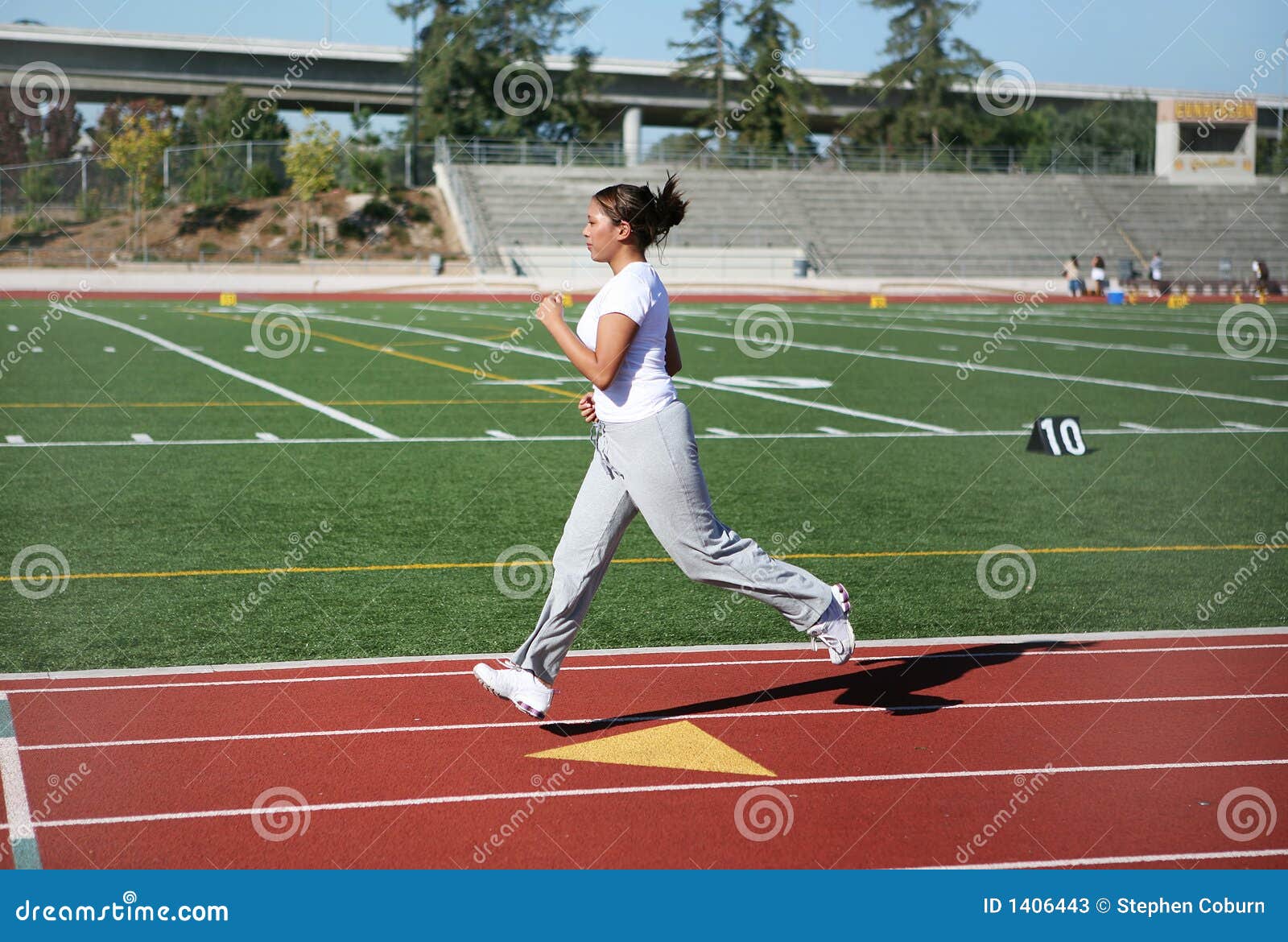 Woman Jogging stock image. Image of female, track, brunette - 1406443