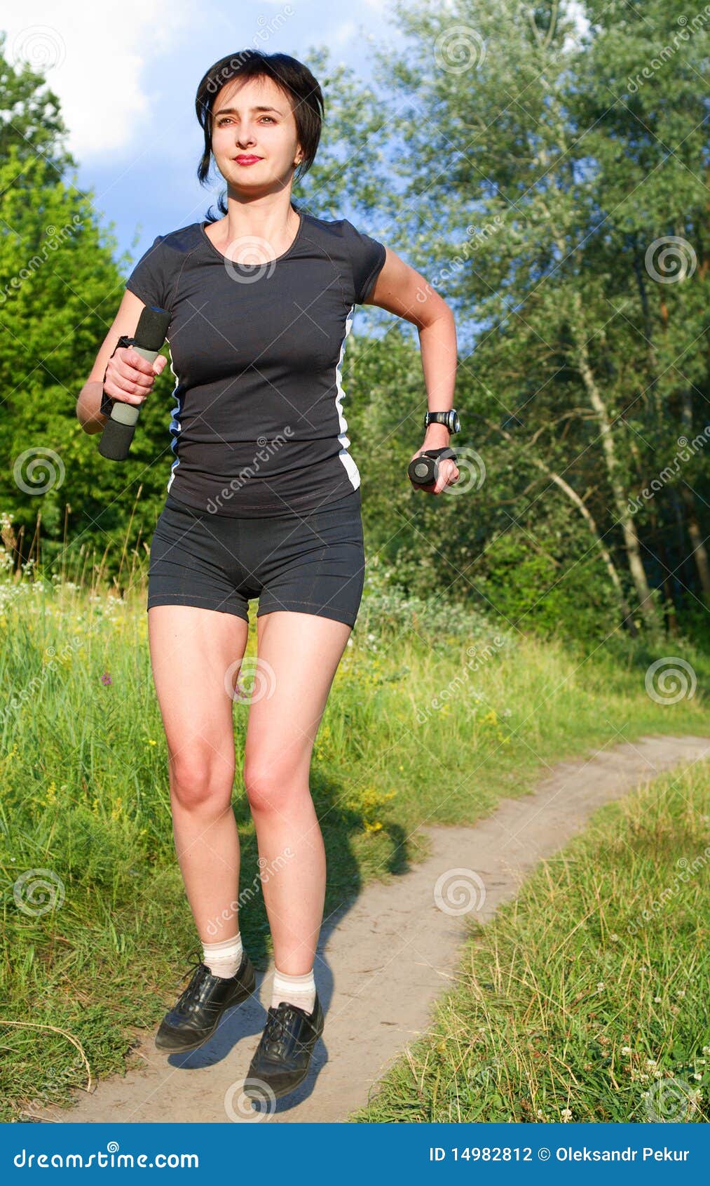 Woman Jogging Outdoors in Forest Stock Photo - Image of girl, road ...