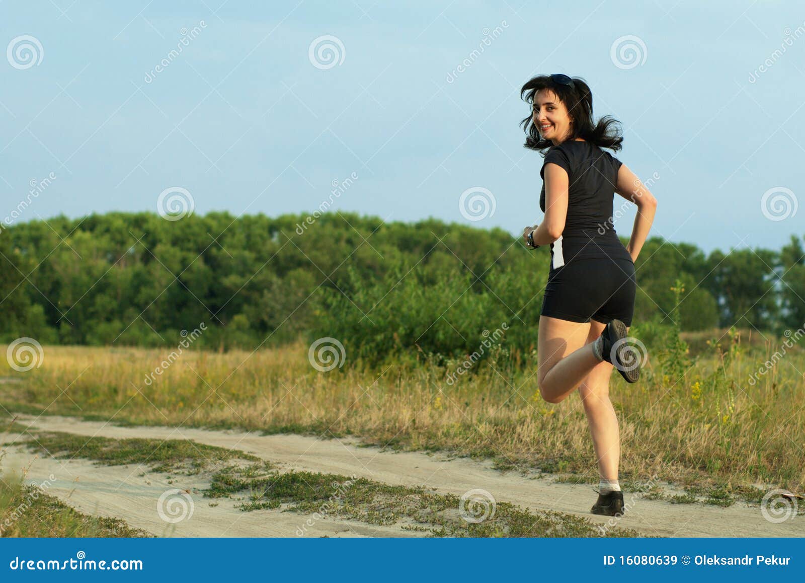 Woman Jogging Outdoors Turn Around Stock Image - Image of woman ...