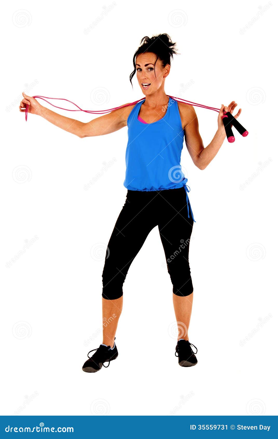 Woman with Jump Rope and Workout Clothes Looking at Camera Stock Image ...