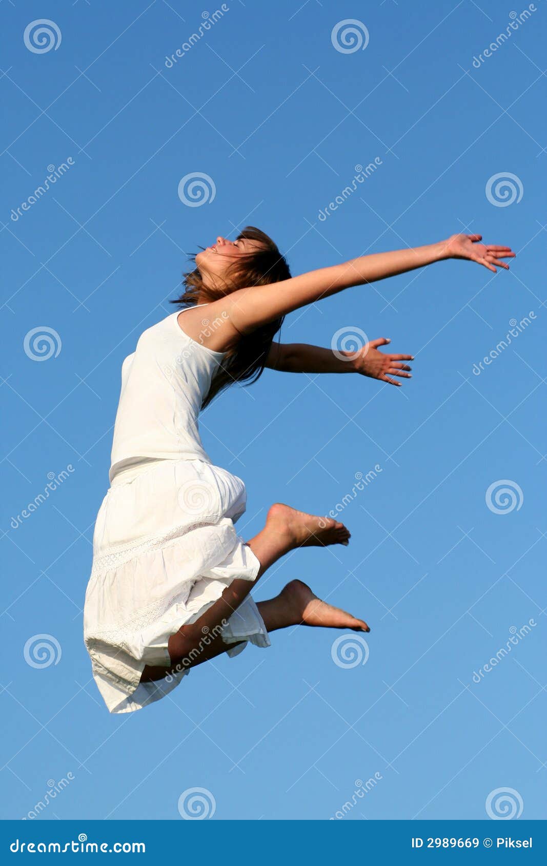 Woman jumping stock image. Image of sunny, playful, outdoors - 2989669