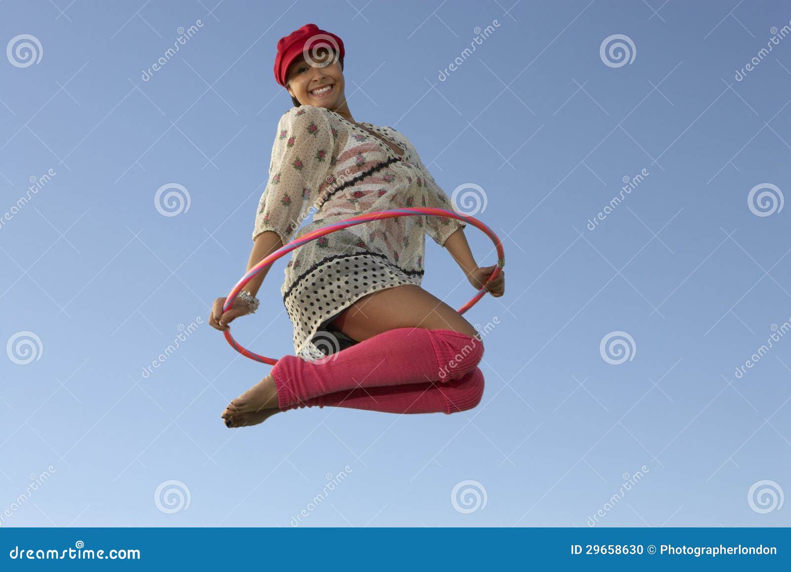 Woman Jumping with Hula Hoop Stock Photo - Image of hoop, cheerful ...