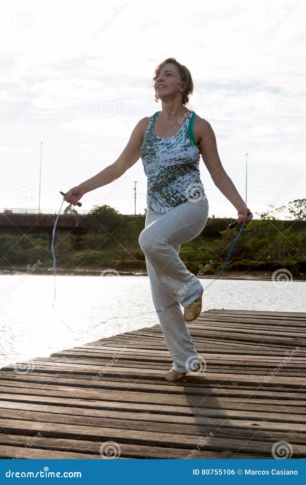 Woman Jumping Rope stock photo. Image of athlete, beautiful - 80755106